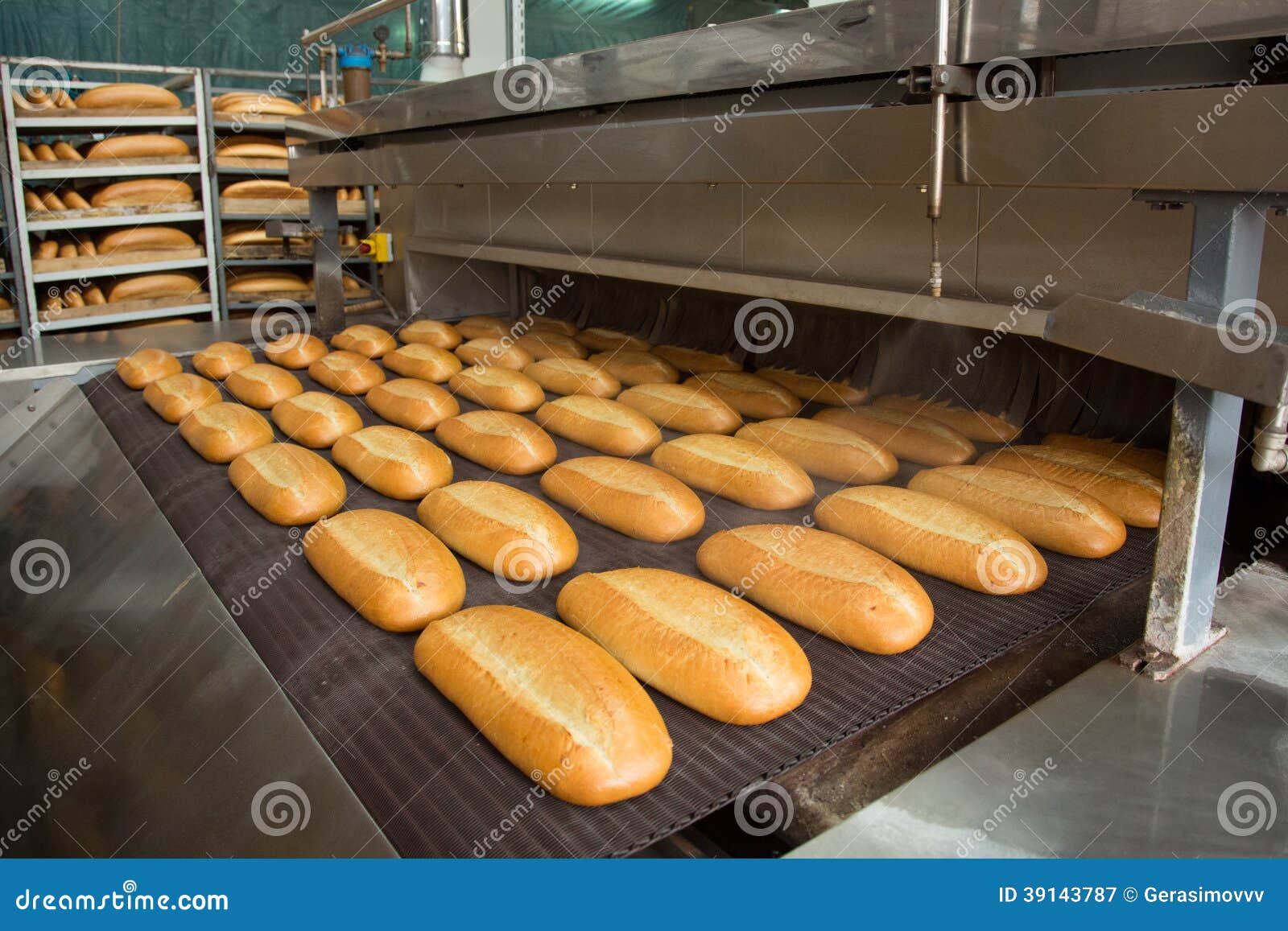 Hot baked breads on a line stock image. Image of manufacturing - 39143787