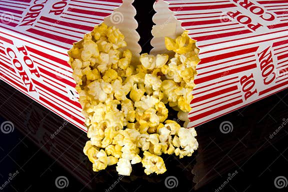 Hot buttered popcorn stock photo. Image of snack, salty - 23402618
