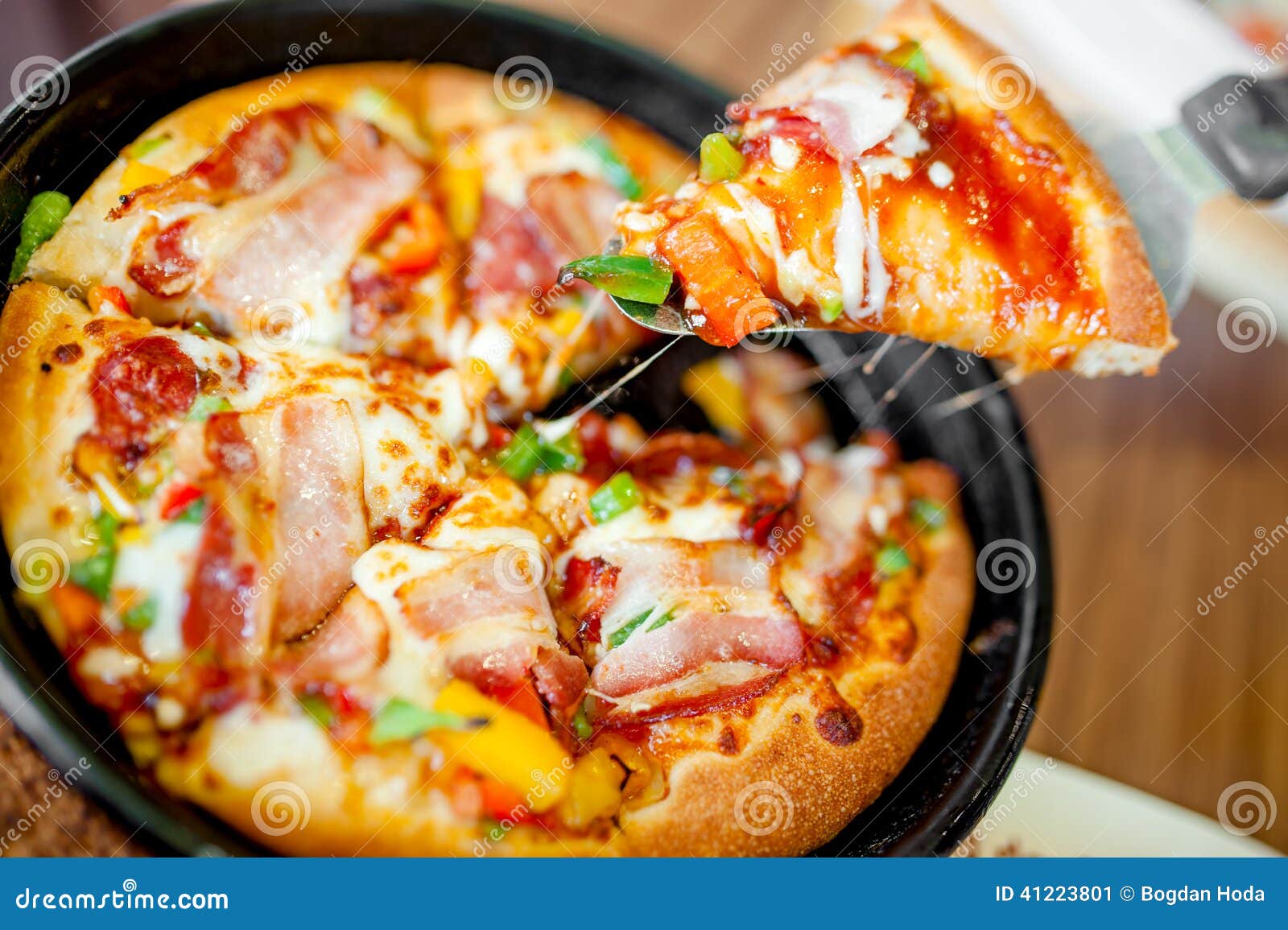 Hot Cannibal Slice of Pizza with Extra Bacon, Ham and Vegetables Stock ...