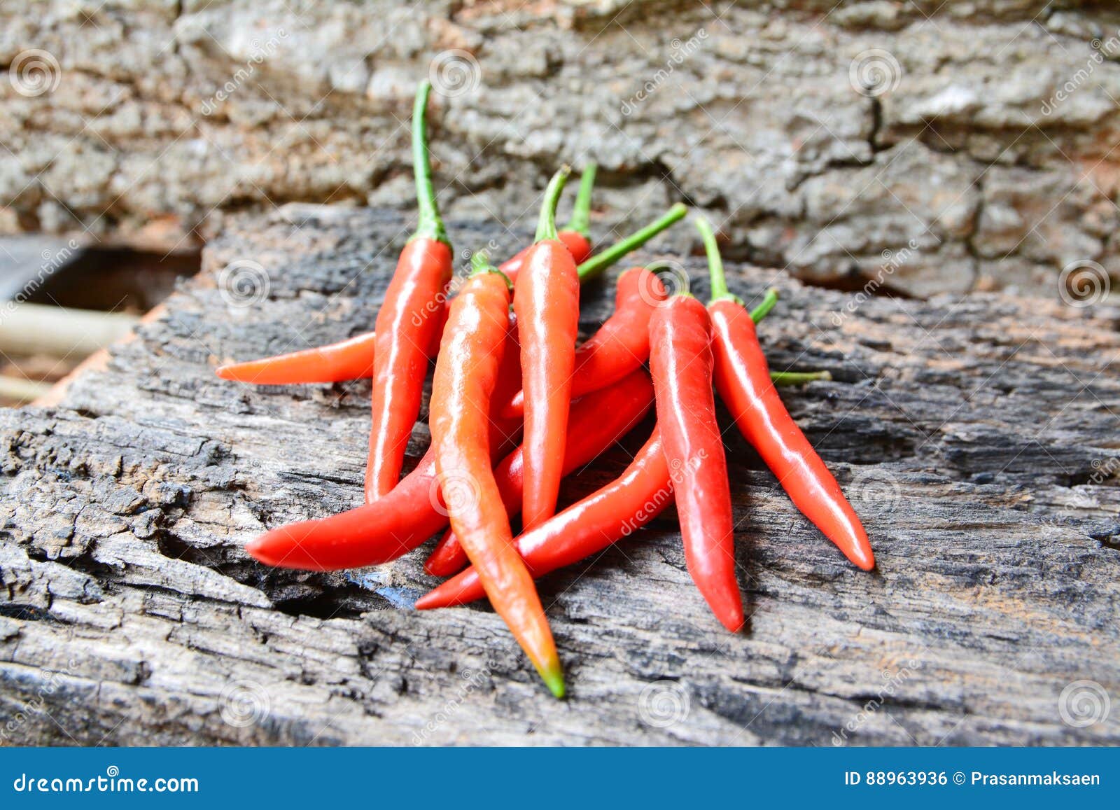 Hot chilli on Wooden floor stock photo. Image of green - 88963936