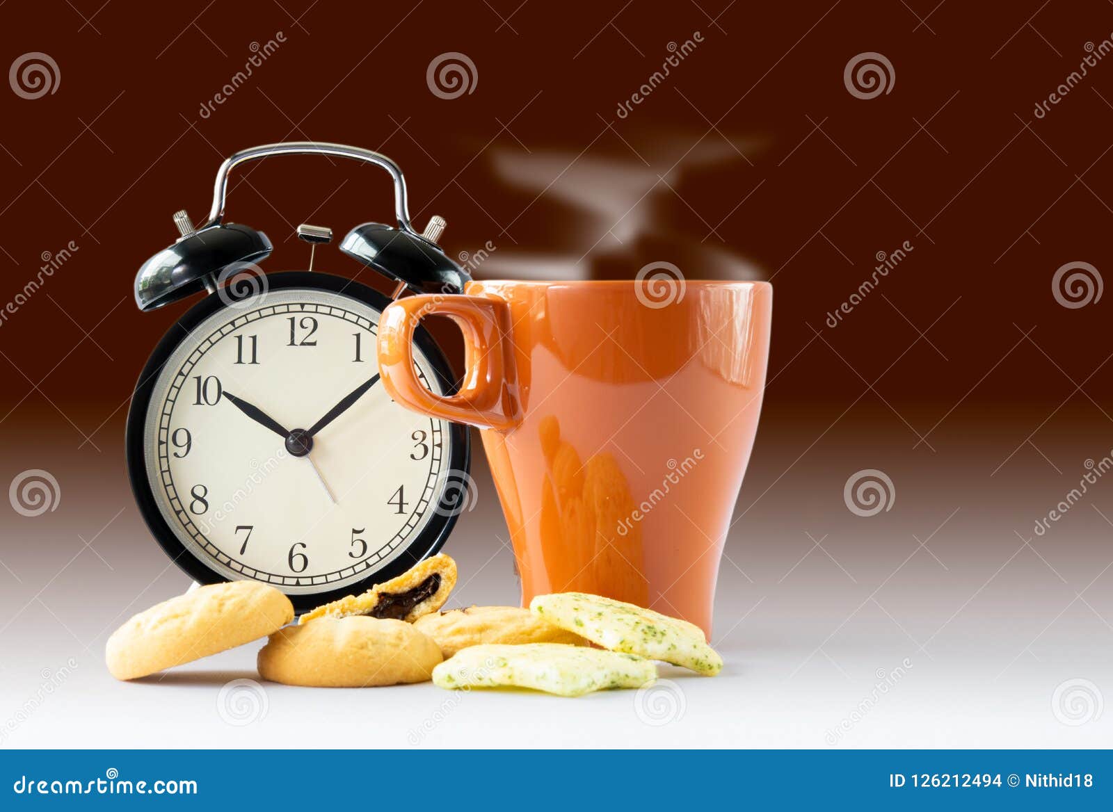 Hot Coffee and Alarm Clock with Biscuits on the Table. Stock Photo ...