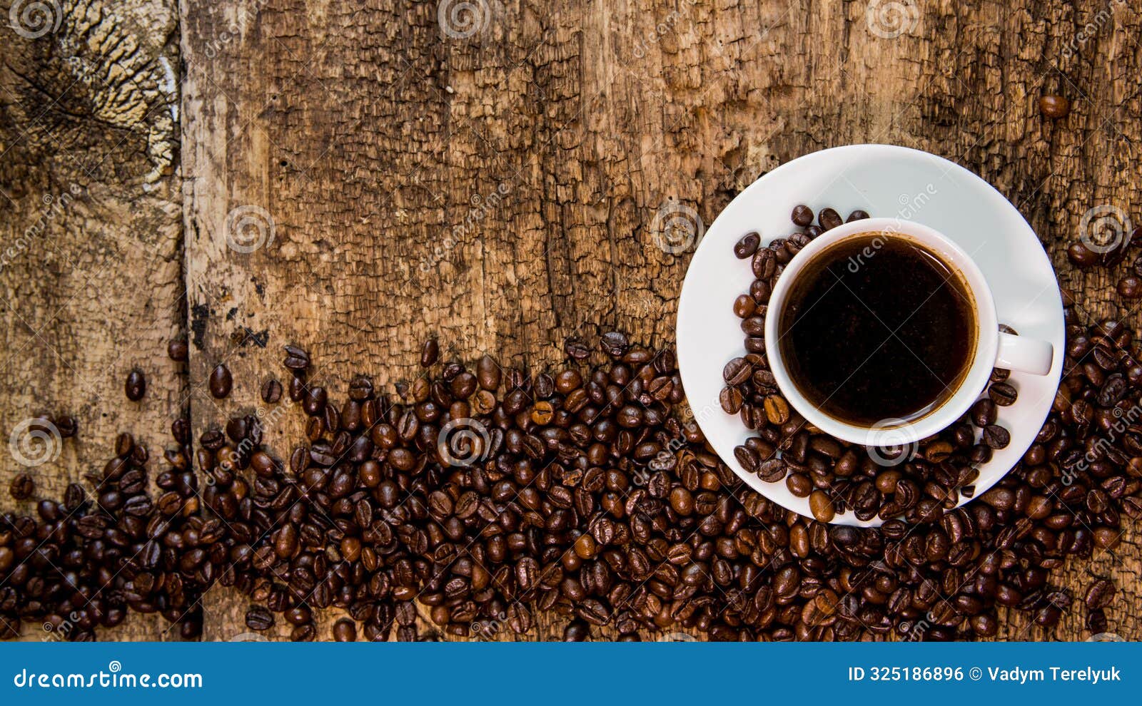 Hot Coffee Cup and Roast Coffee Beans on a Wooden Table. Dark ...