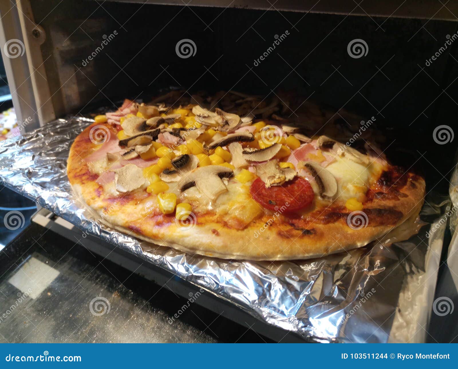 Hot Cooked Pizza on Tin Foil Stock Photo - Image of cooked, foil: 103511244