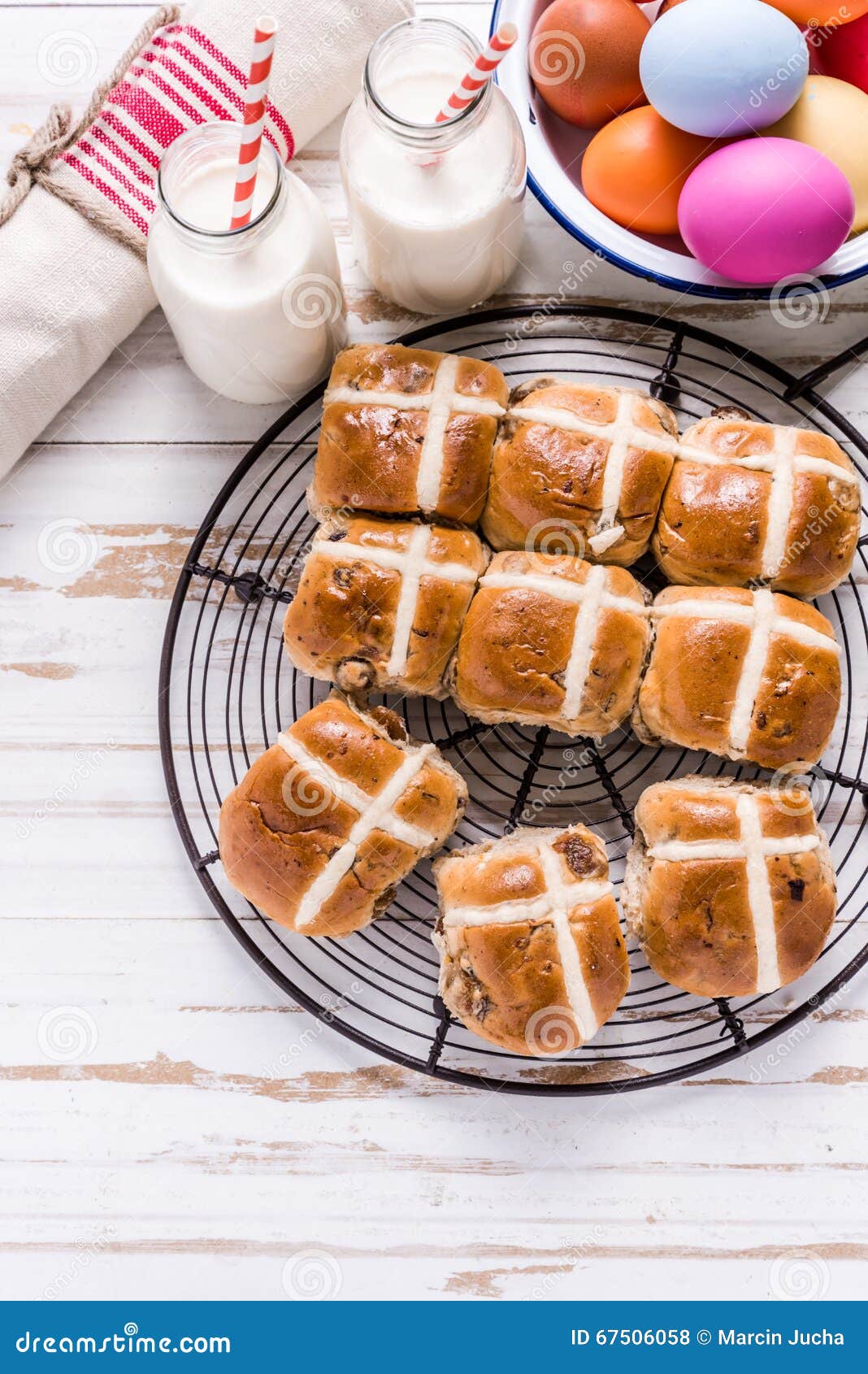 Hot Cross Bun on Tray with Easter Vibrant Eggs and Milk. Stock Photo ...