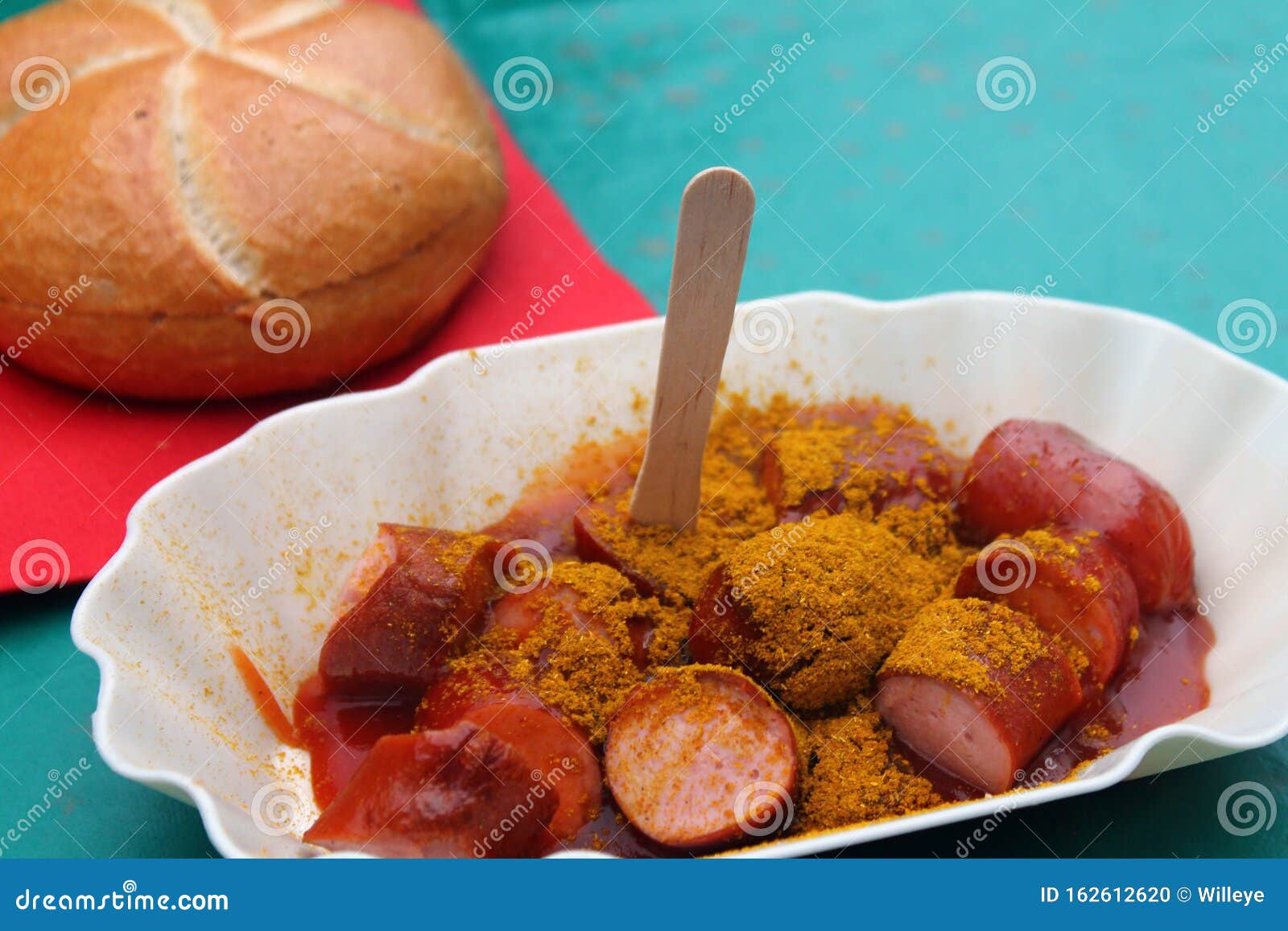 Hot Curry Wurst And Typical Bread Stock Photo - Image of fork, ketchup ...