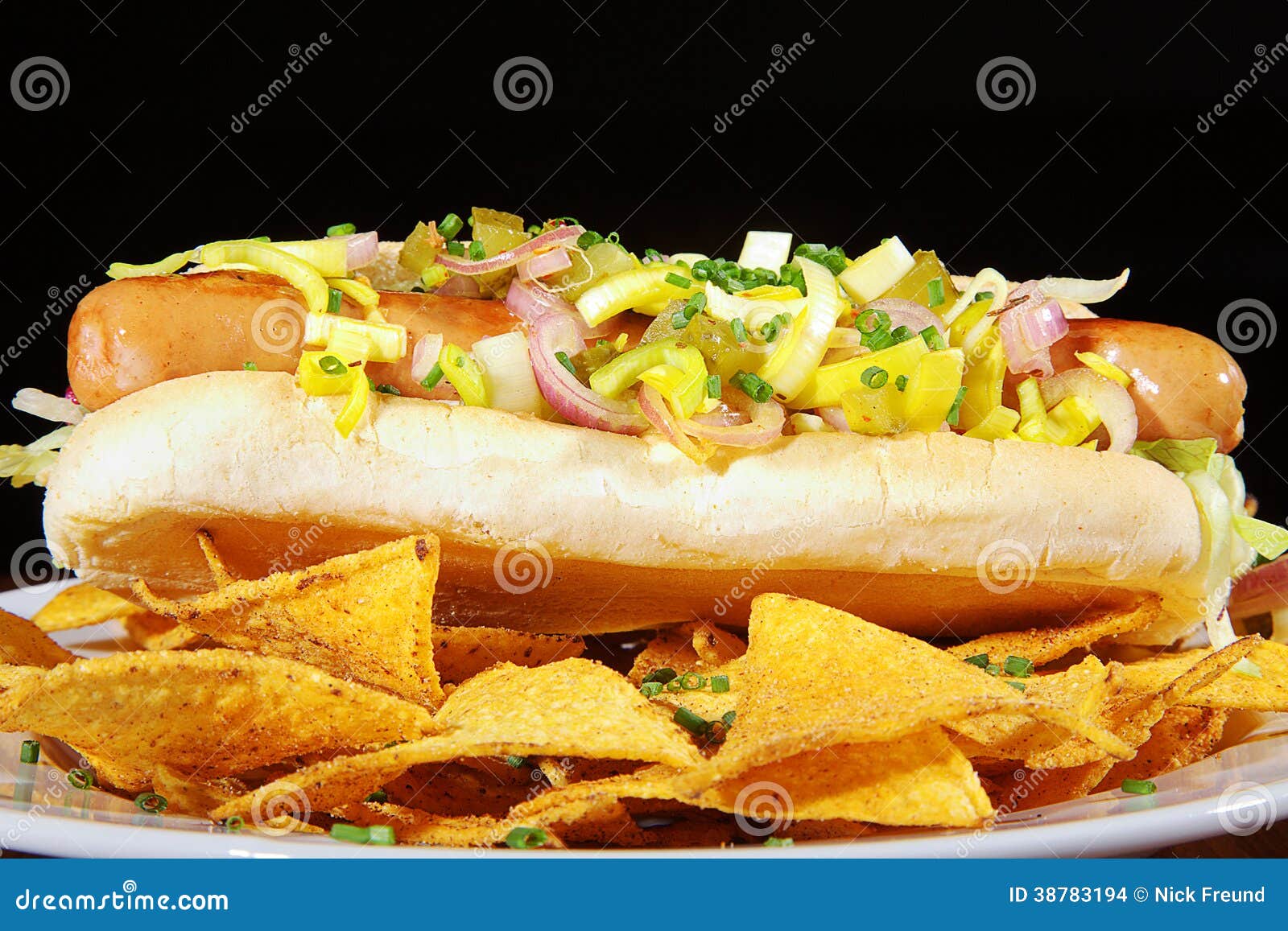 Hot dog with nachos stock photo. Image of restaurant - 38783194