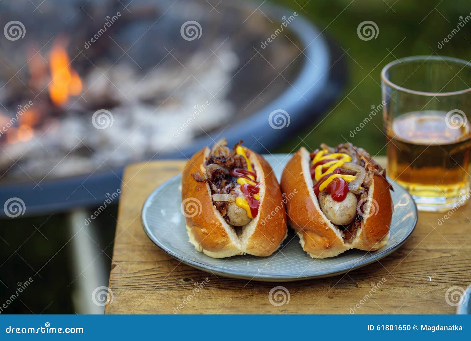 Hot dogs by the camp fire stock photo. Image of sauce - 61801650