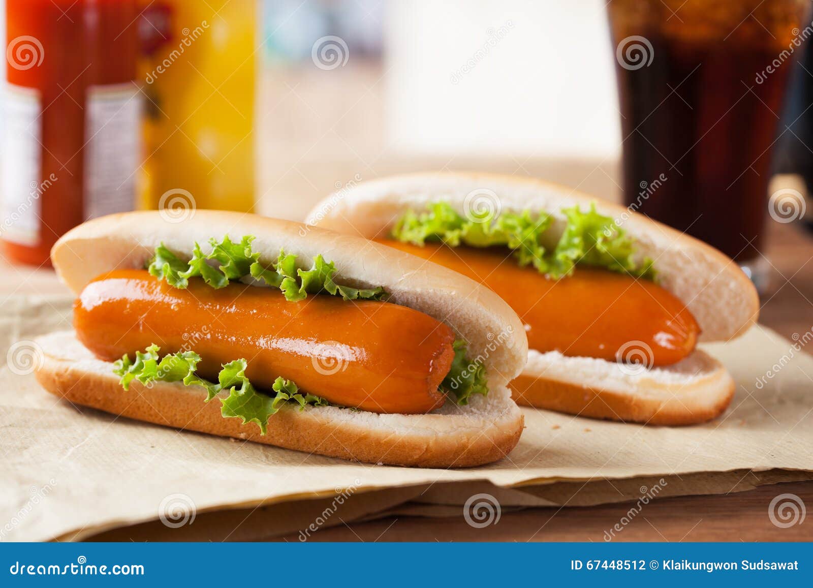Hot dogs on paper for meal stock photo. Image of bread - 67448512