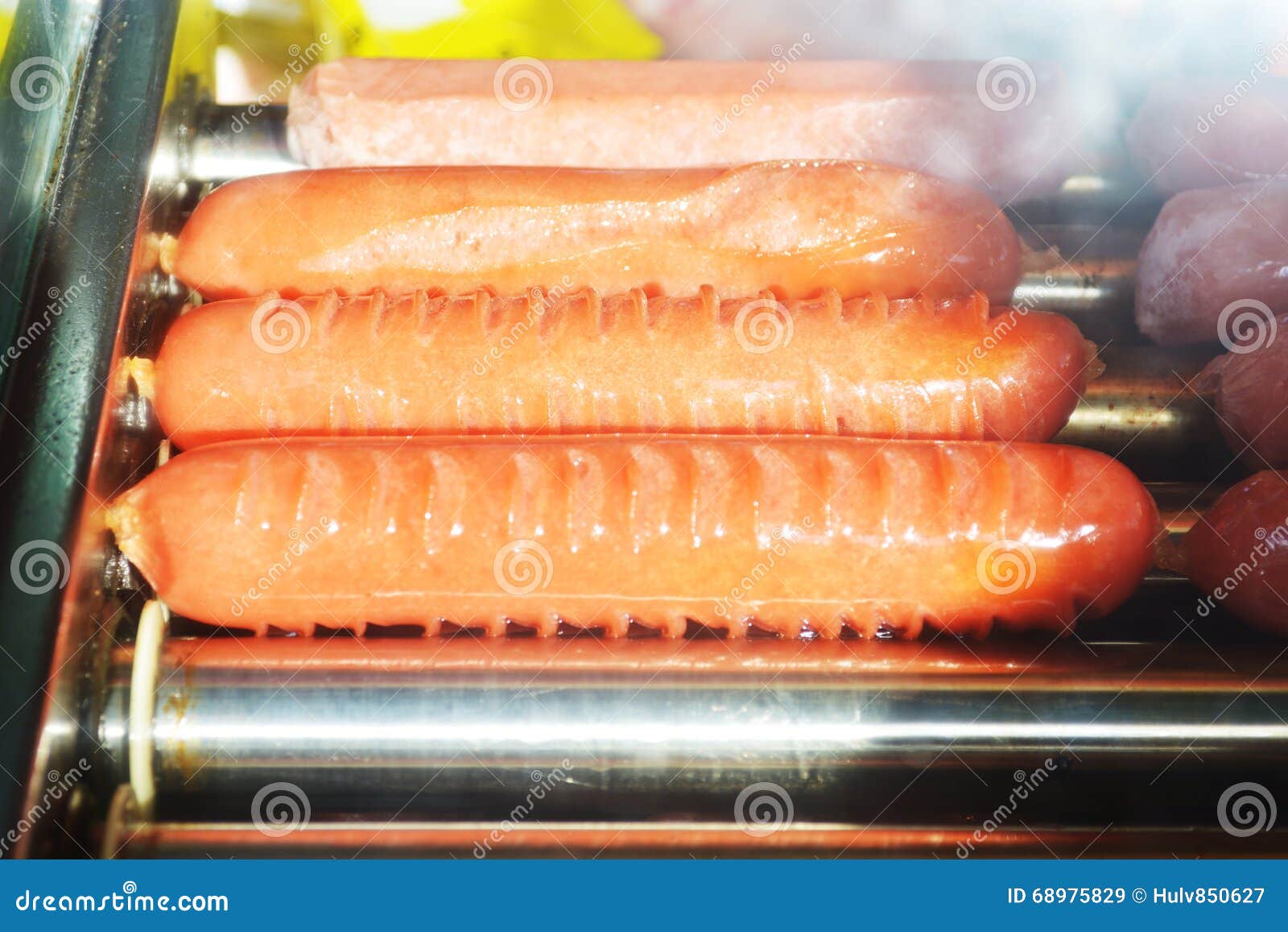 Hot dogs on the stick stock image. Image of bratwurst - 68975829
