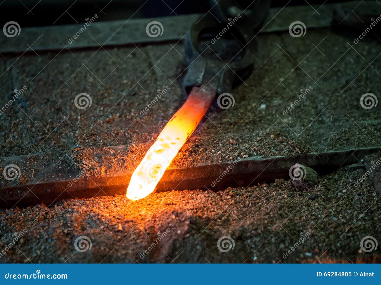 Hot forging steel stock image. Image of molten, tongs - 69284805