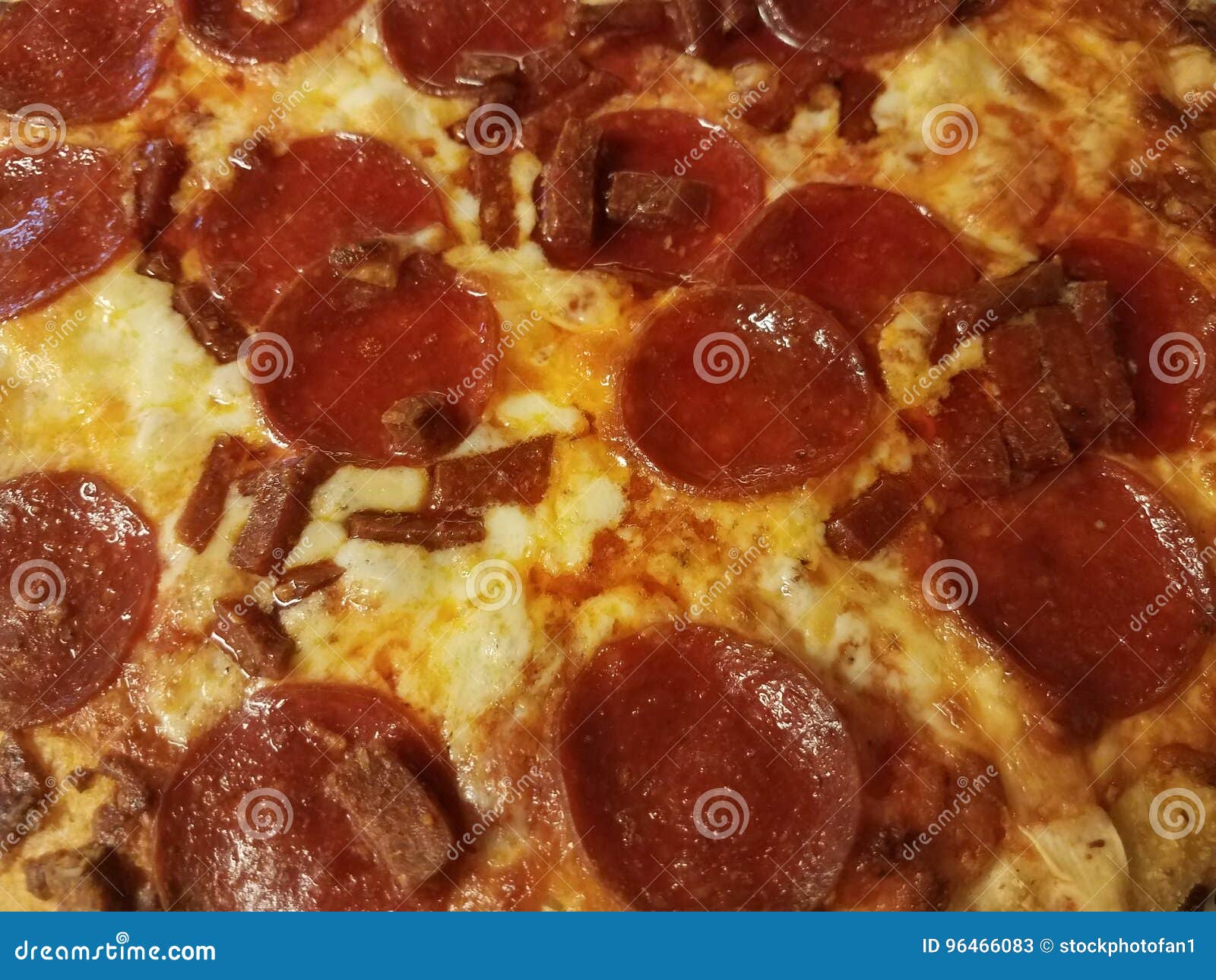 Hot greasy pepperoni pizza stock image. Image of cheese - 96466083