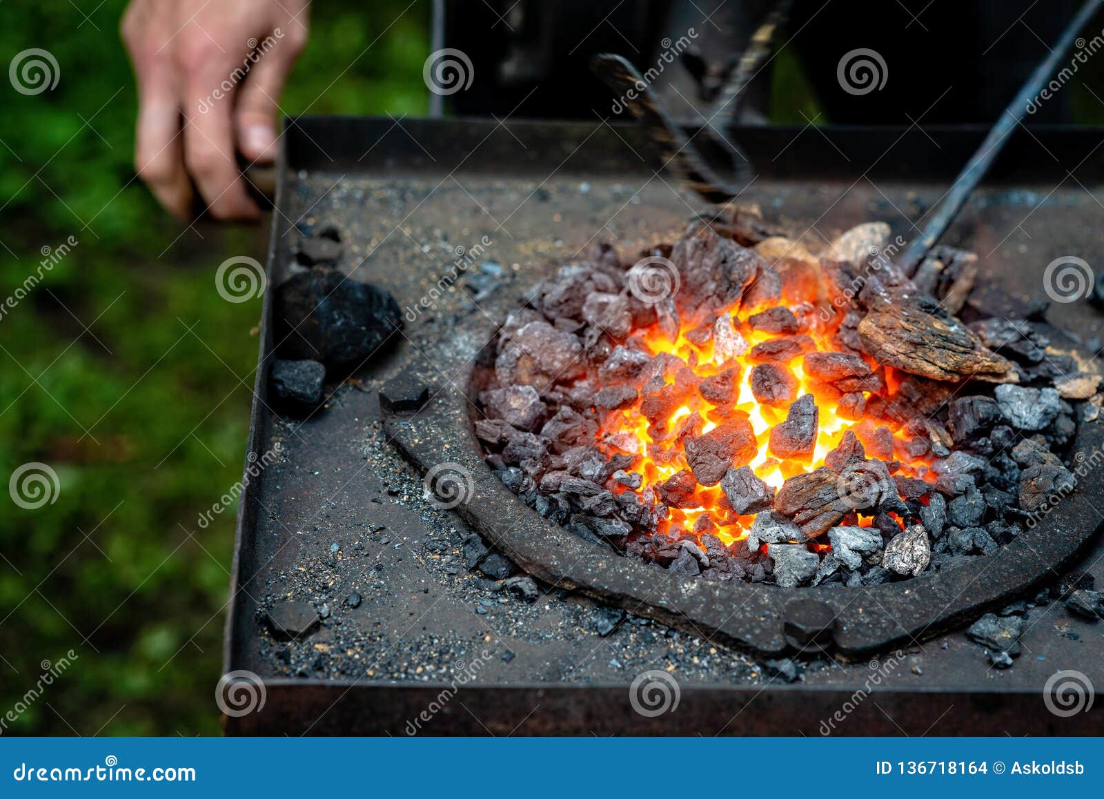 Hot Item is Inserted into the Blacksmiths Forge from Which the Tongues ...