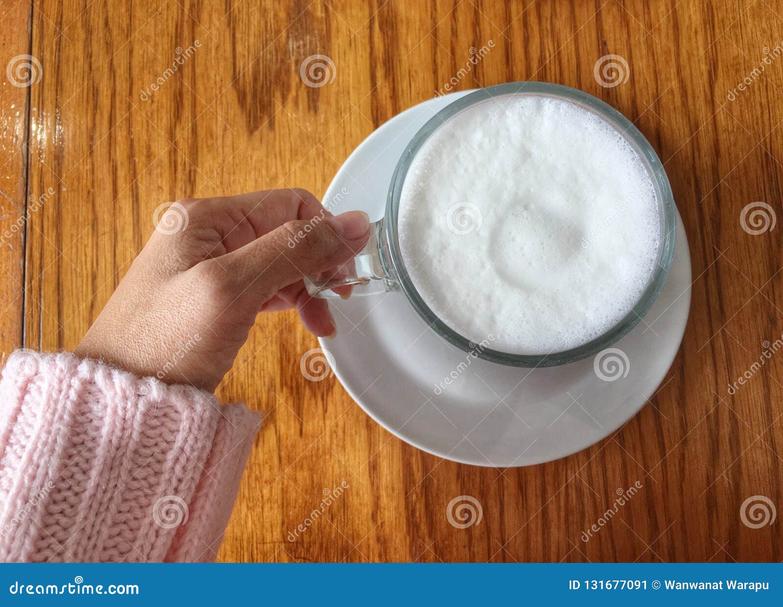 Hot Milk in a Cold Day stock image. Image of woodentable - 131677091