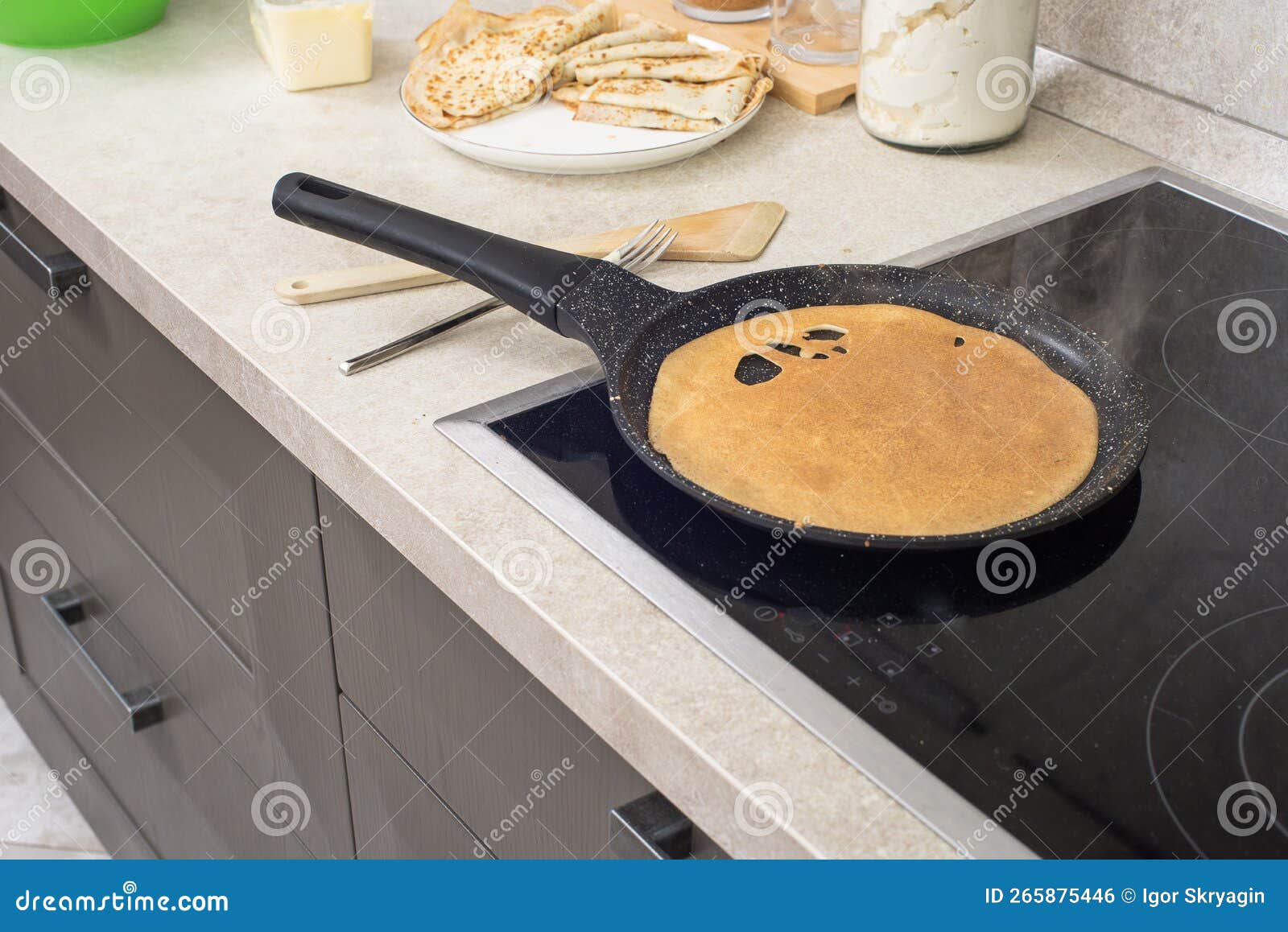 Hot Pancake in a Pan on a Hot Stove in the Kitchen Stock Photo - Image ...