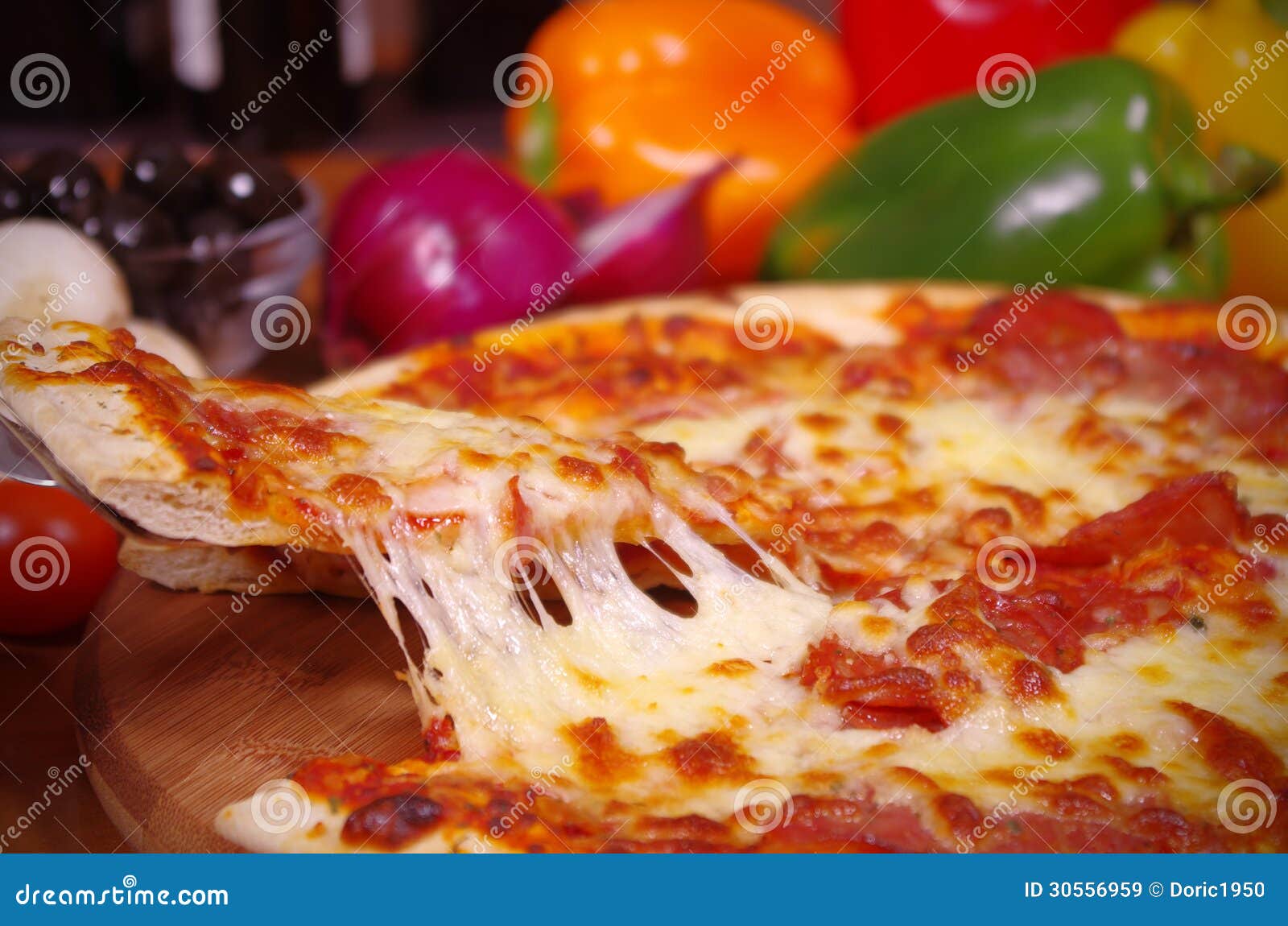 Hot Pizza Slice Being Served Stock Image - Image of peppers, olives ...