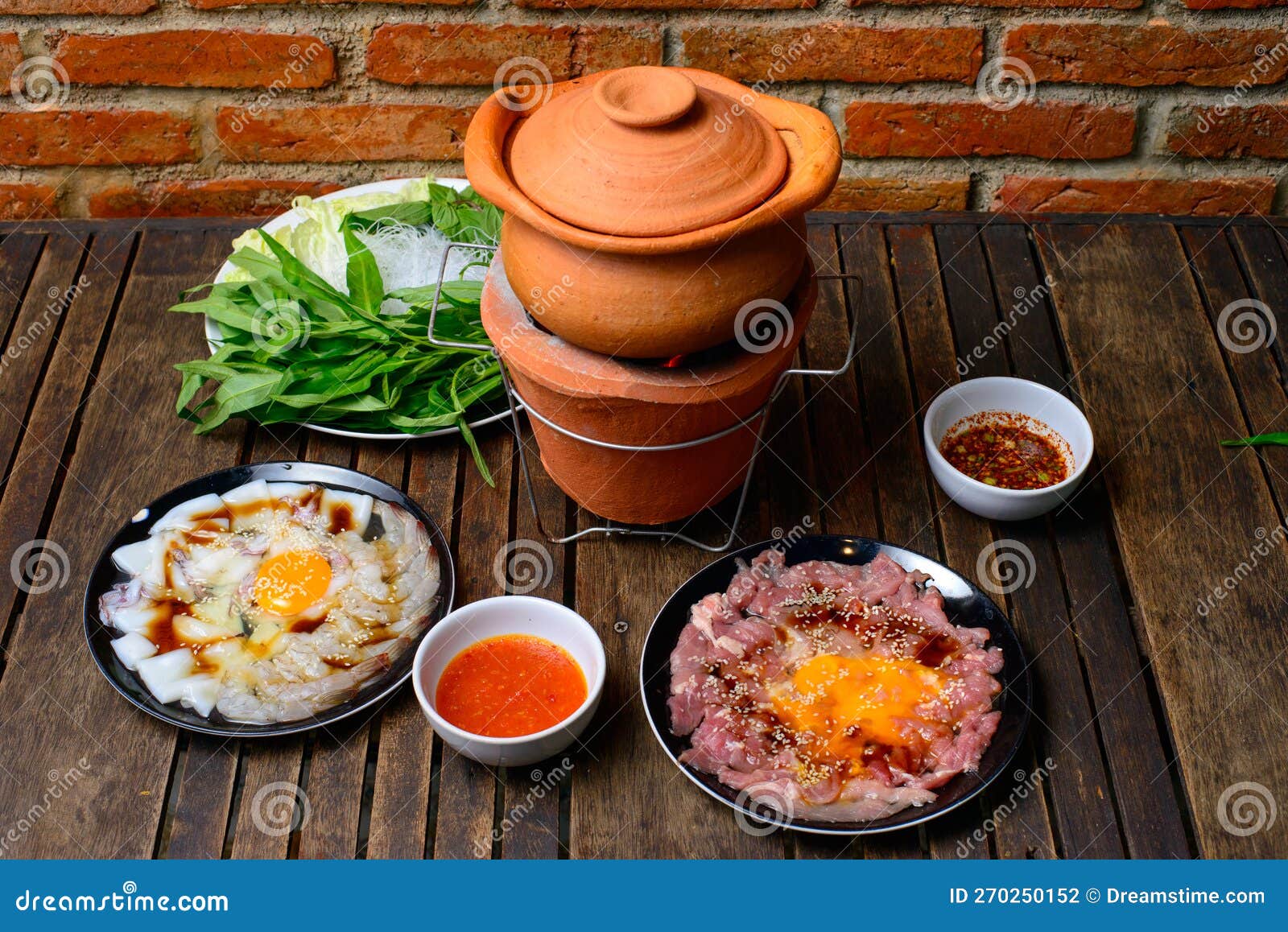 Hot Pot with Clear Soup in the Clay Cooking Pot. Stock Photo - Image of ...