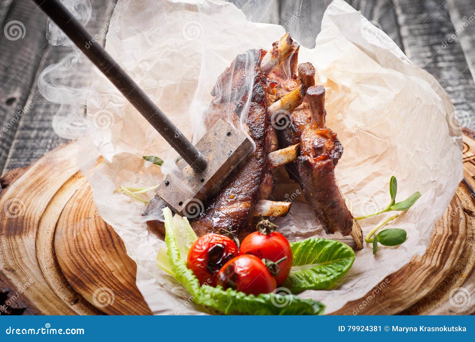 Hot ribs with vegetables. stock image. Image of color - 79924381