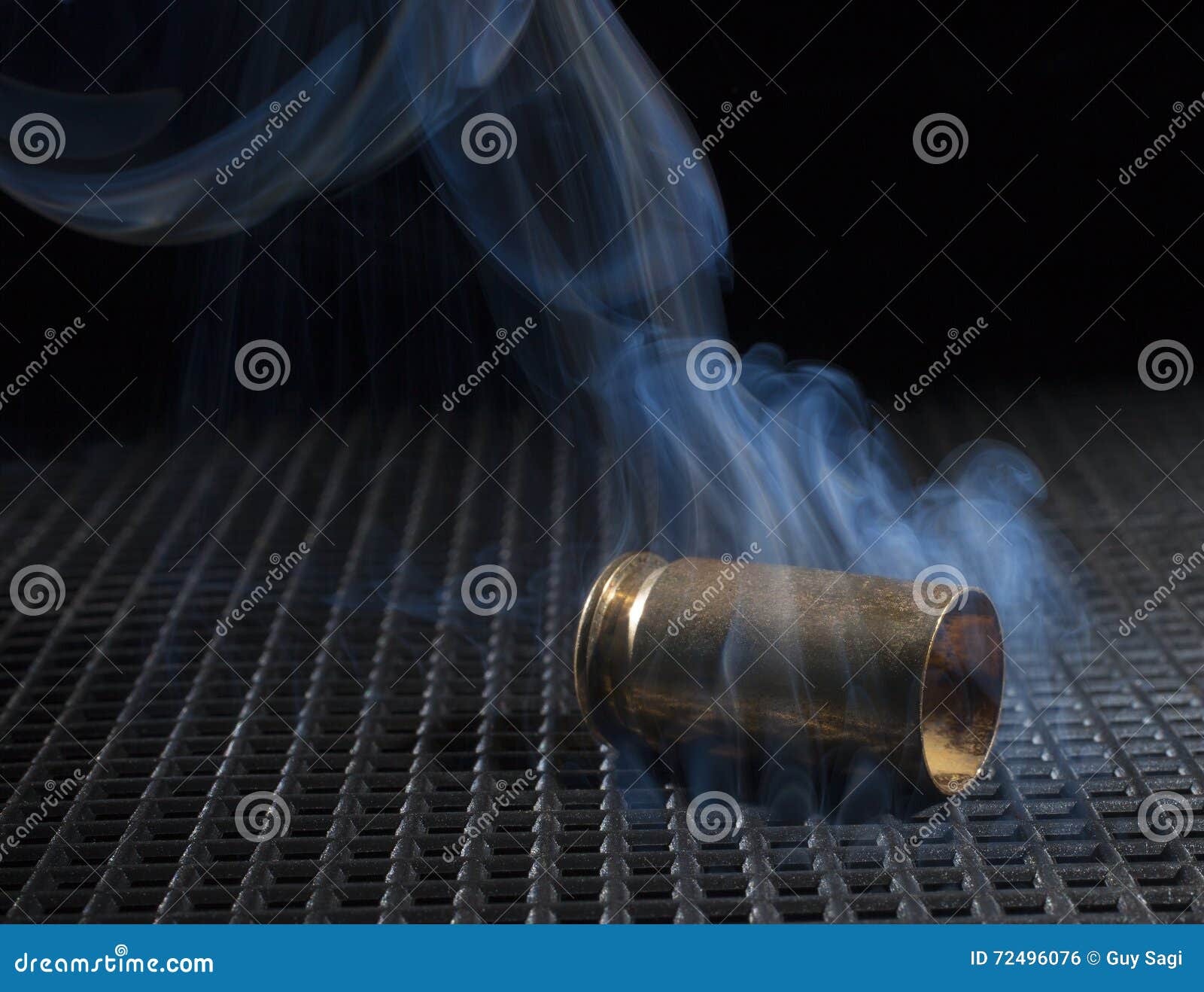Hot shell stock photo. Image of ammo, blue, smoke, shooting - 72496076