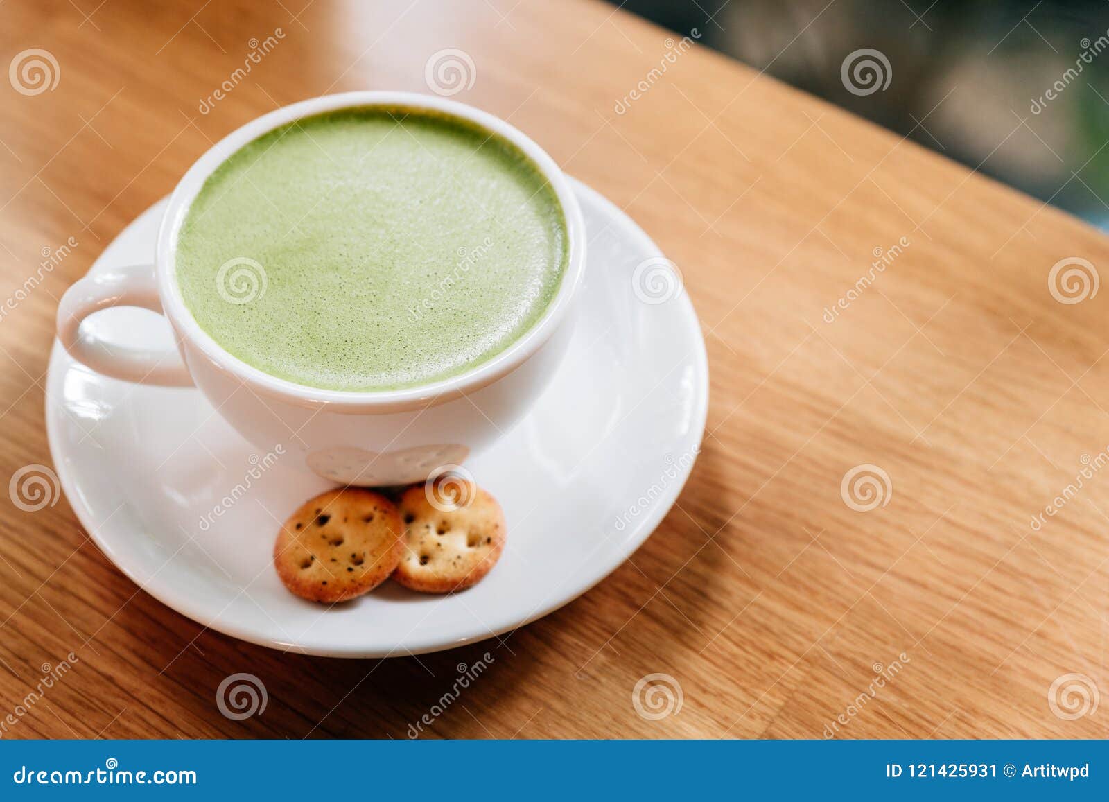 Hot and Smooth Green Tea Latte with Froth Served in White Ceramic Cup ...
