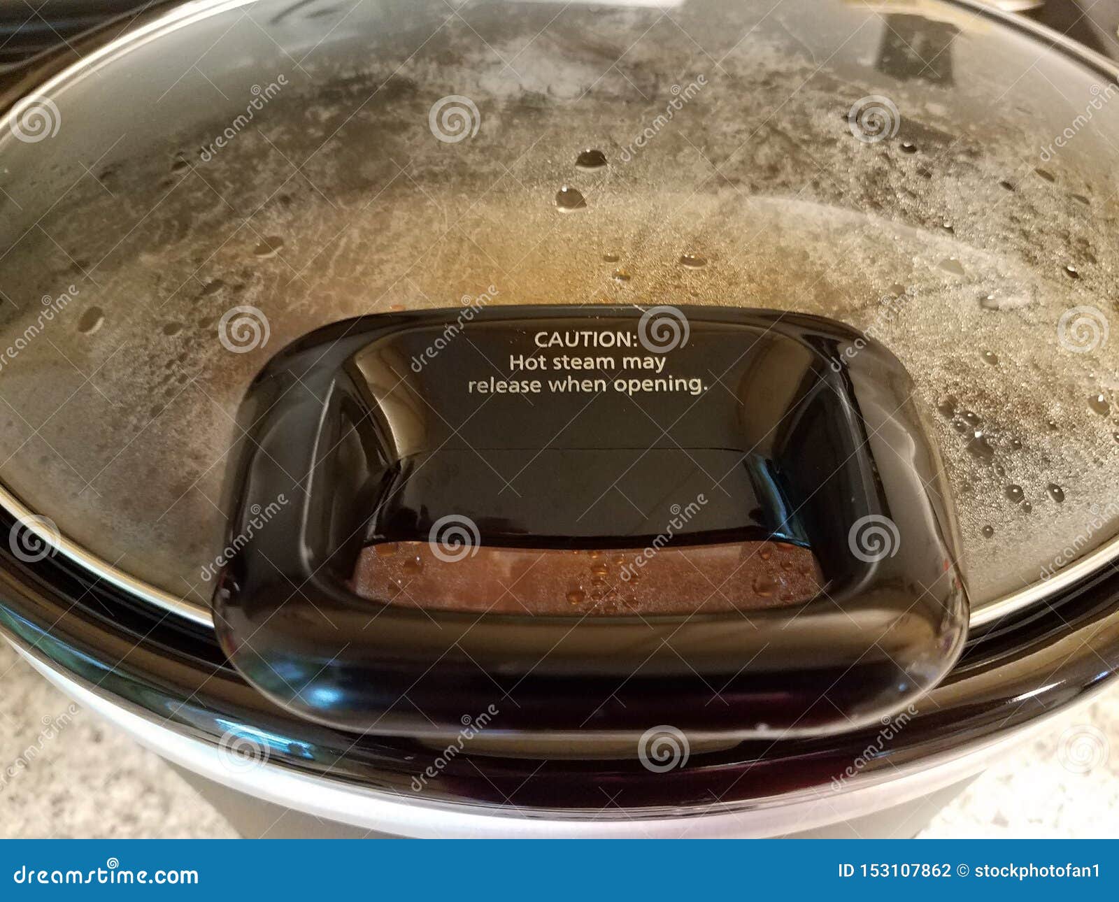 Hot Steam May Release when Opening on Hot Pot Cooker Stock Photo ...
