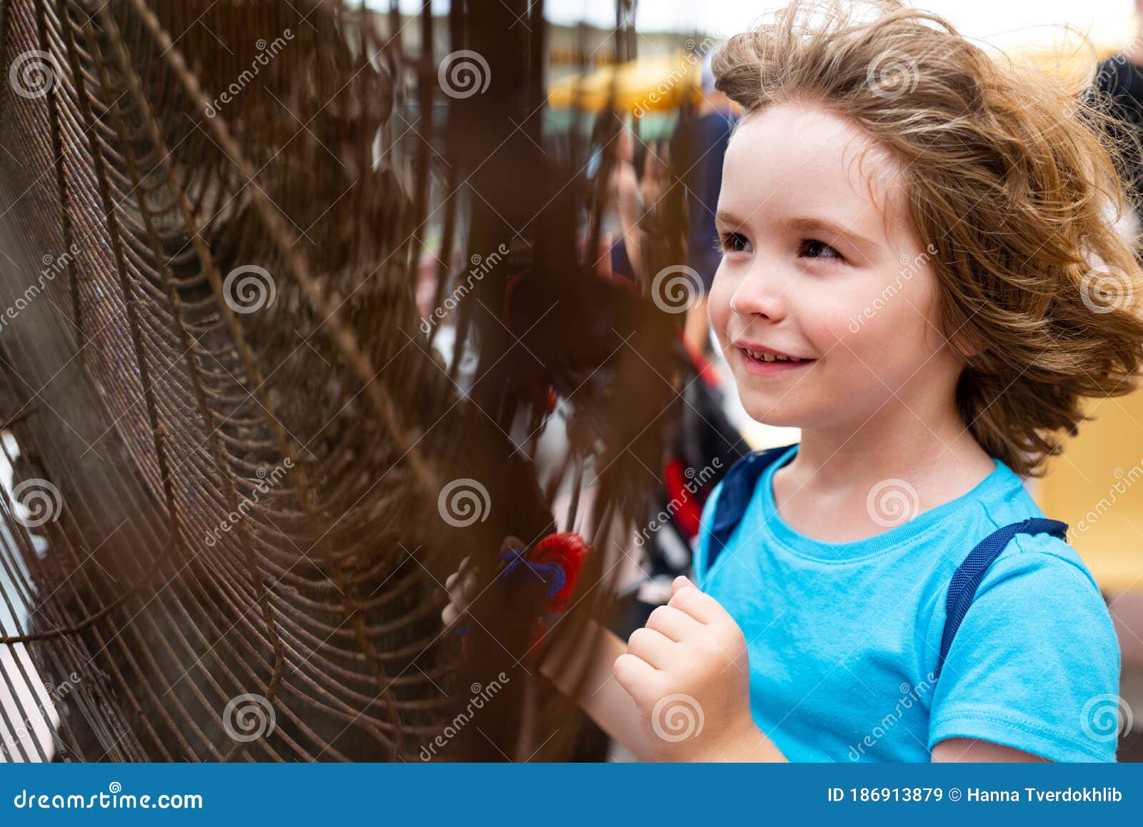 Hot Summer. the Child Enjoys the Wind from the Cooler. Freshness and ...