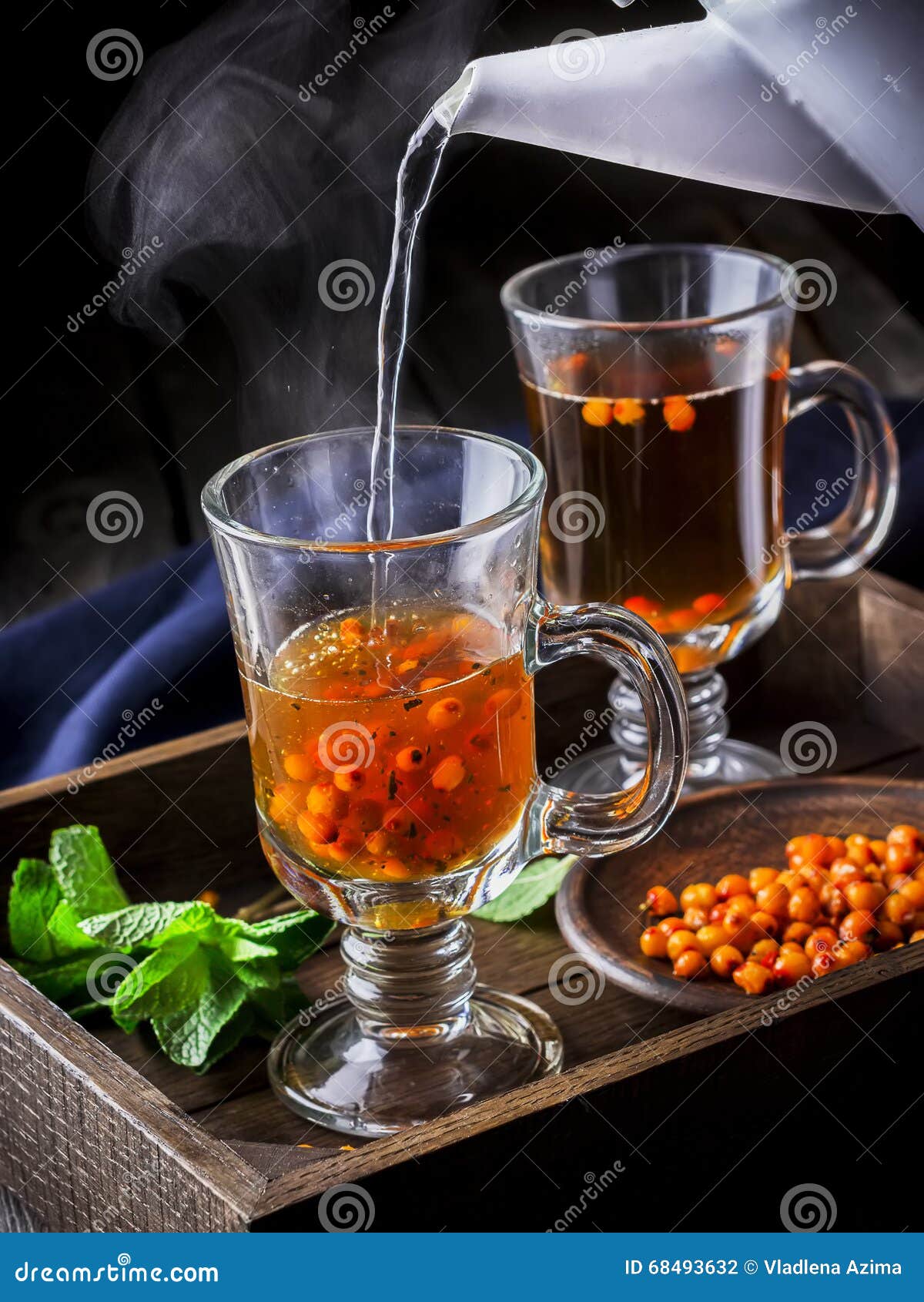 Hot Tea Flowing in Glass Cup with Berries. Stock Photo - Image of ...