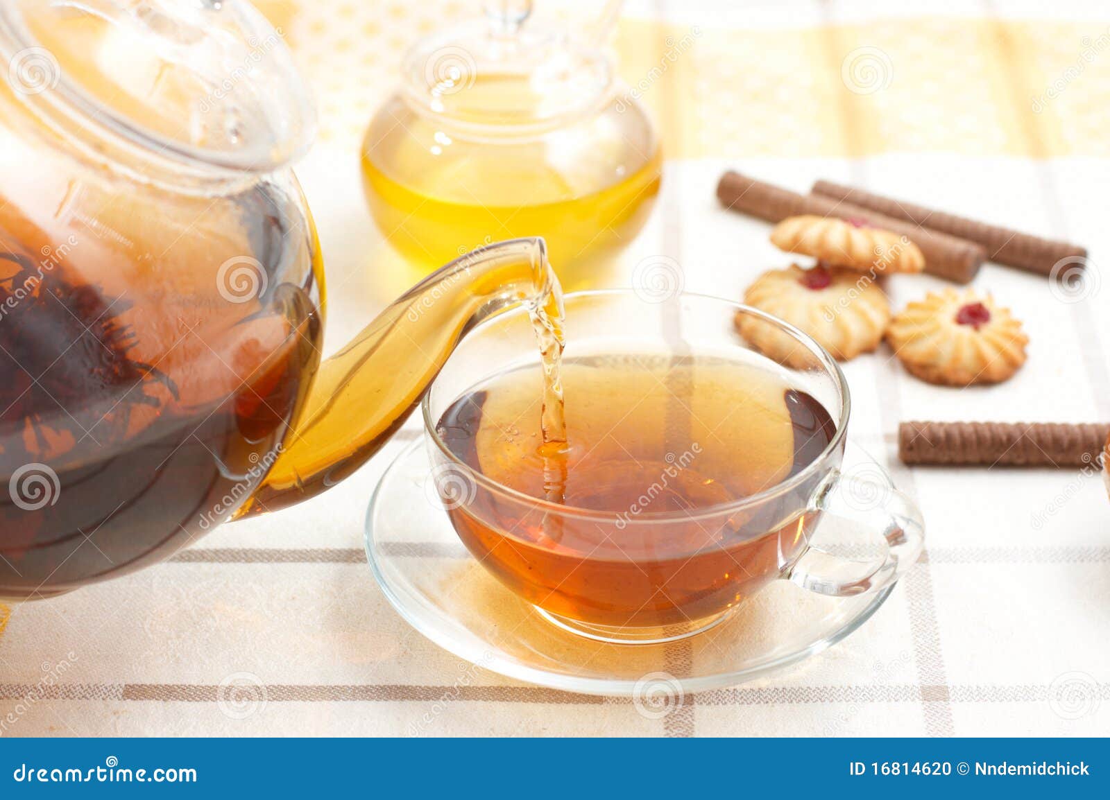 Hot Tea Flowing from Teapot Stock Photo - Image of flowing, teapot ...