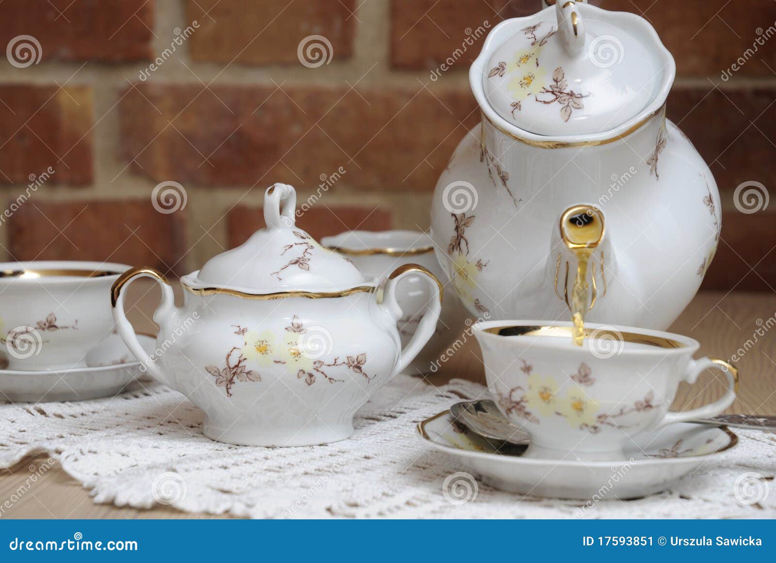Hot tea in porcelain jug. stock image. Image of golden - 17593851
