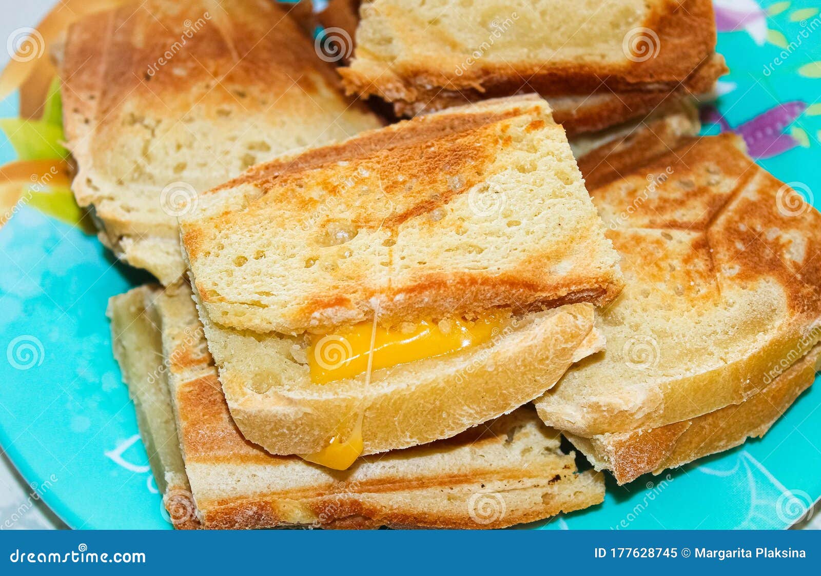 Hot Toast with Melted Cheese for Breakfast Made in a Sandwich Maker at ...