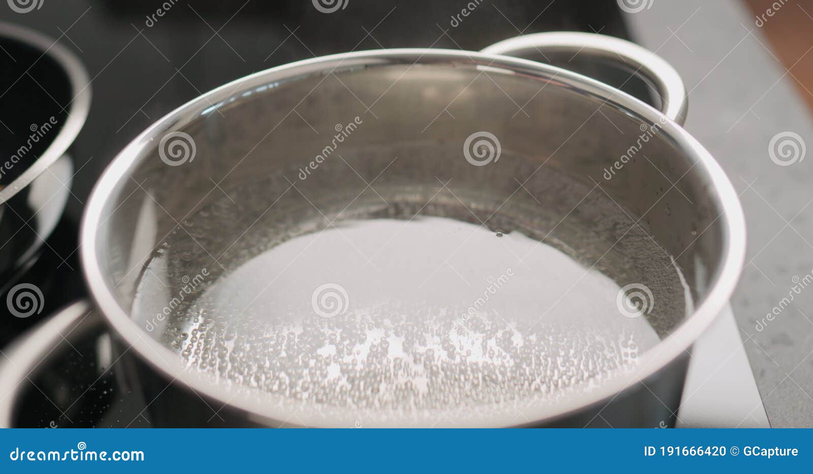 Hot Water in Pot before Boiling Stock Photo - Image of liquid, clear ...