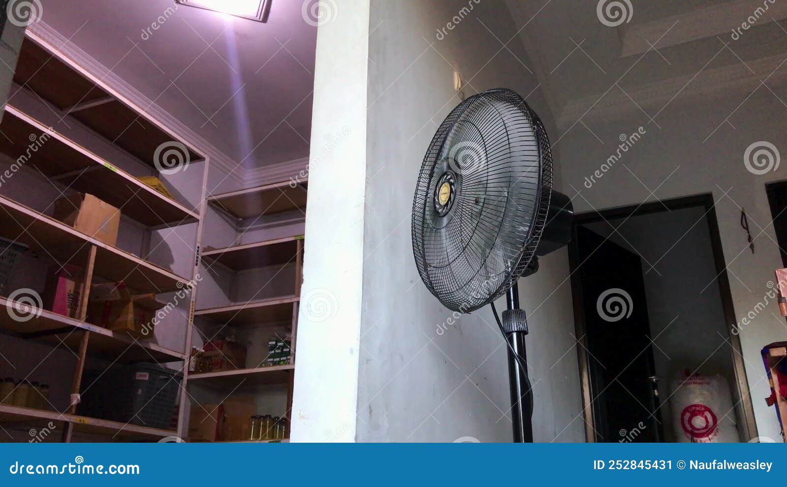 Hot Weather in an Empty Warehouse with a Large Fan Spinning Stock Video ...