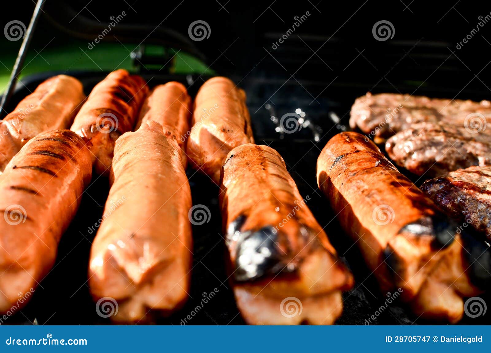 Hotdogs on the grill stock image. Image of hamburgers - 28705747