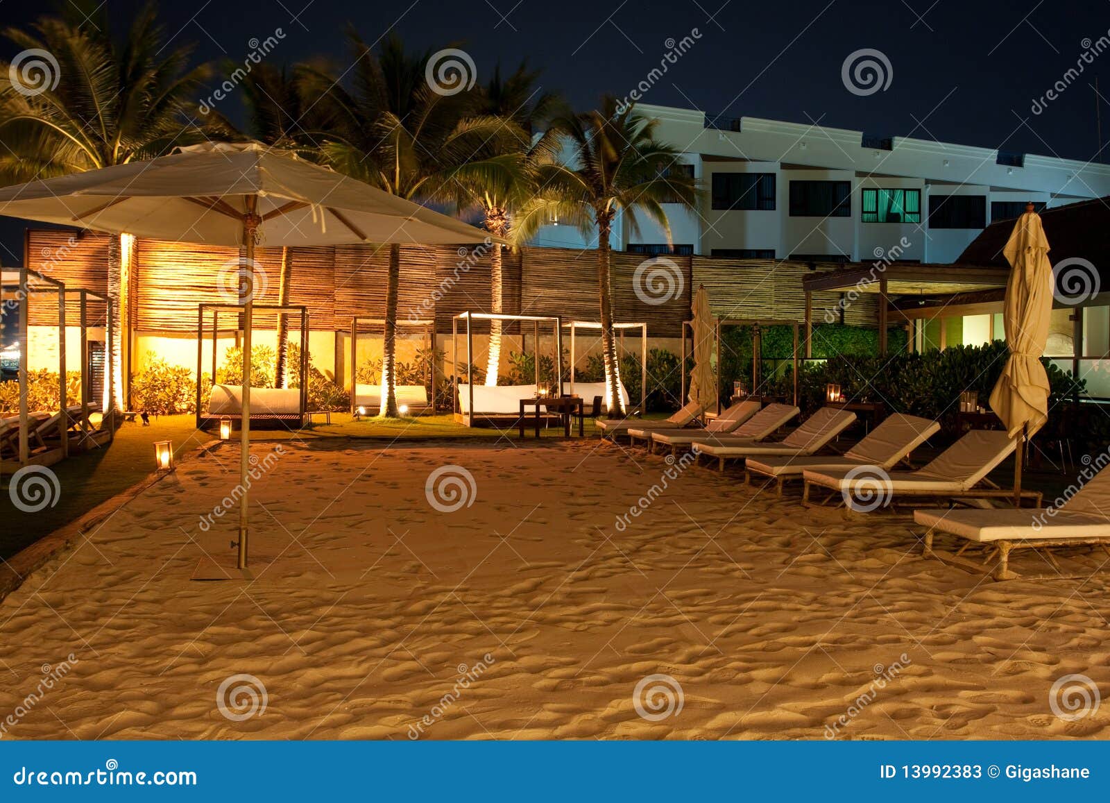 Hotel beach at night stock image. Image of scene, night - 13992383
