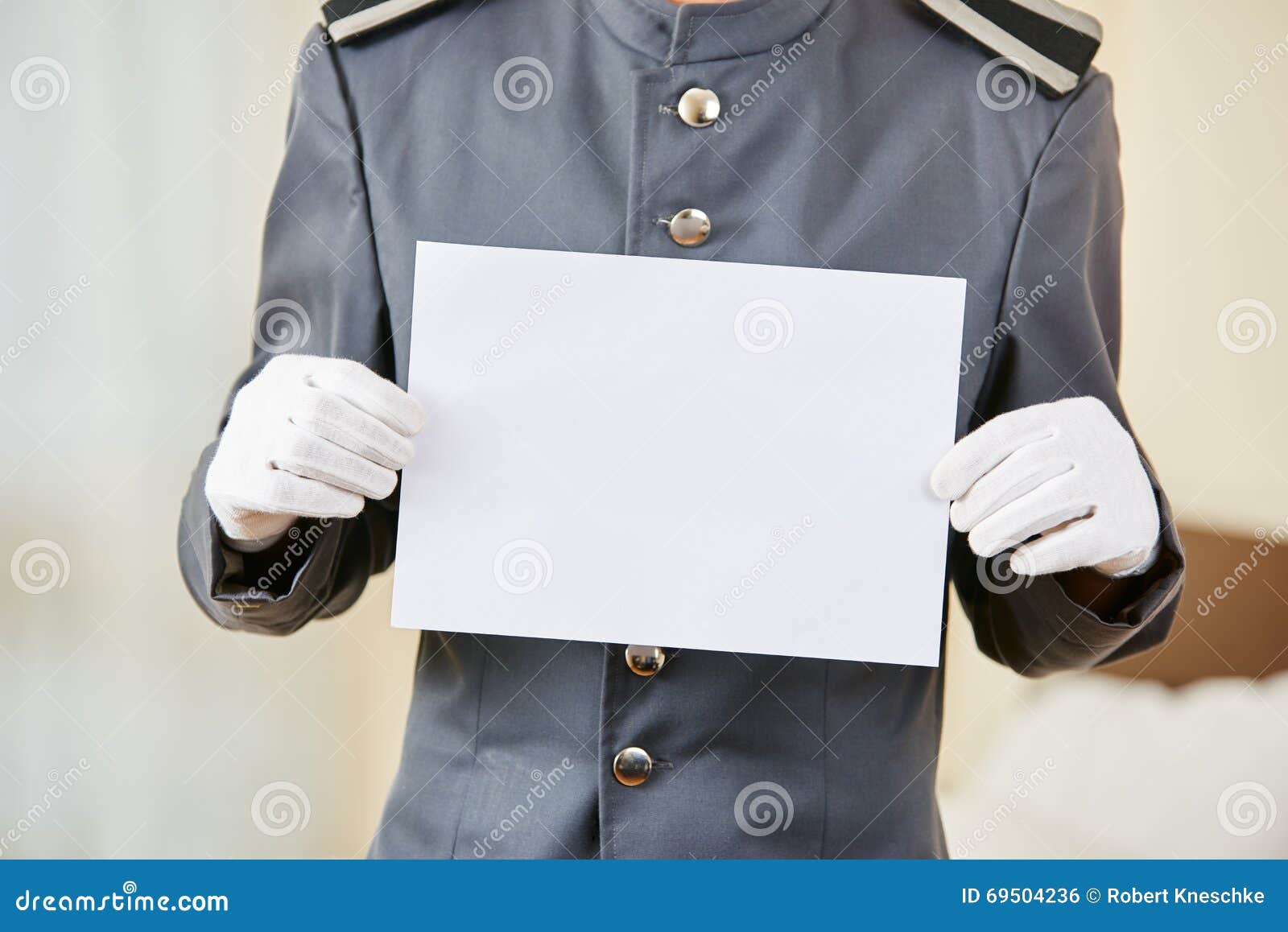 Hotel Clerk Holding Empty White Paper Stock Photo - Image of service ...