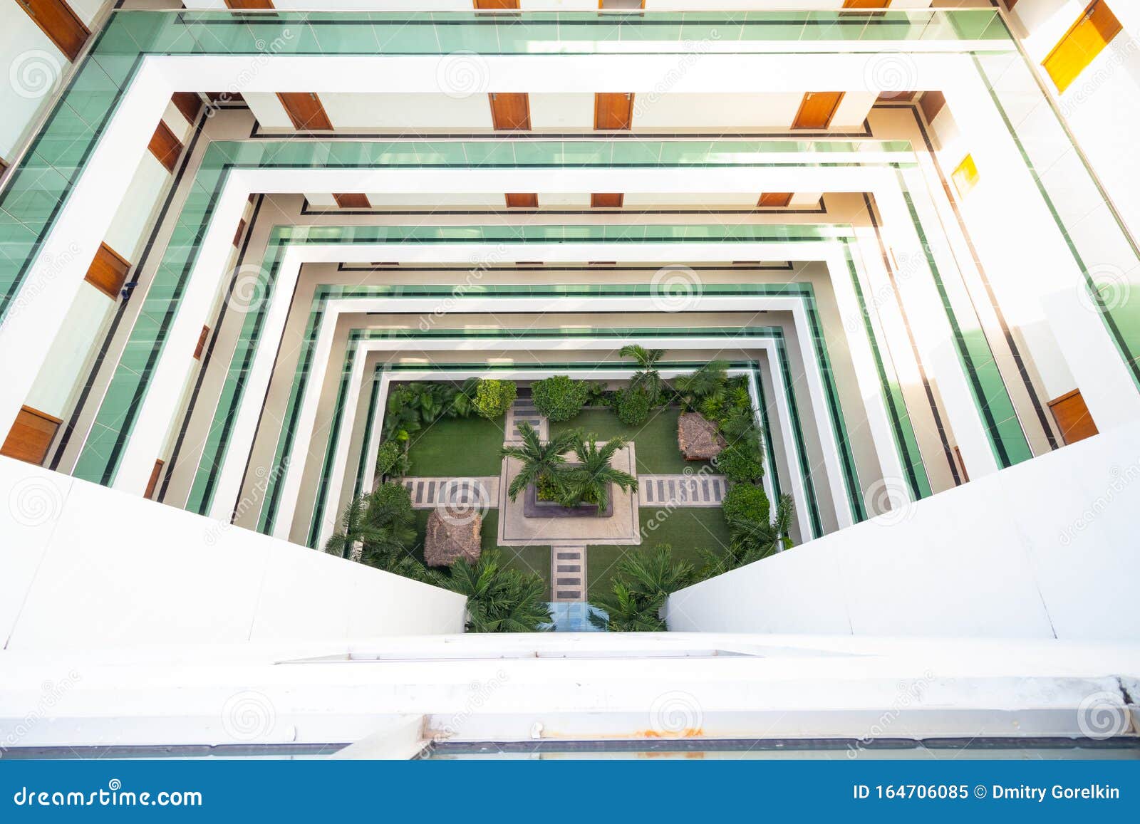 Hotel Courtyard with Grass Lawn and Balcony Stock Image - Image of ...