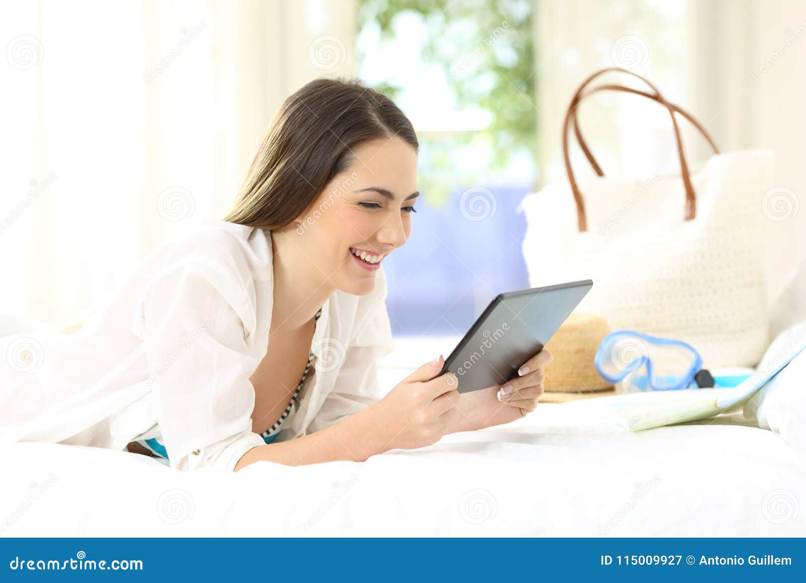 Hotel Guest Using a Tablet on Summer Vacations Stock Image - Image of ...