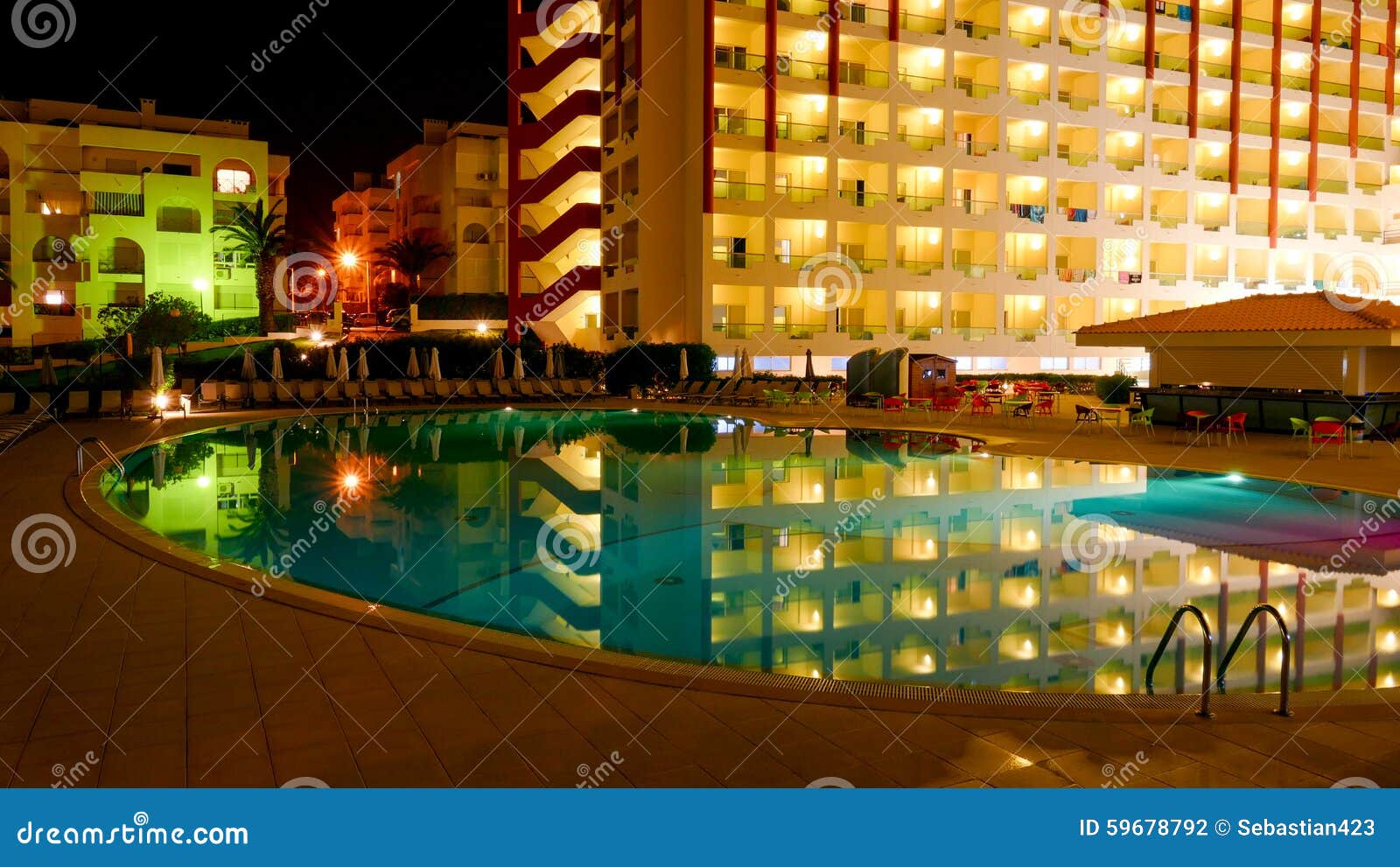 Hotel with Illuminated Swimming Pool at Night Stock Photo - Image of ...