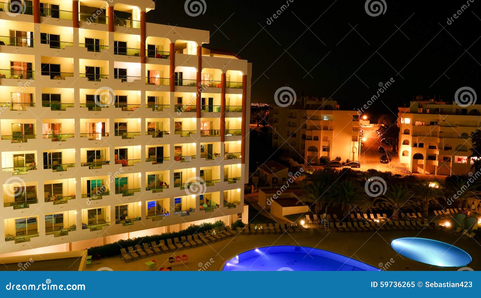 Hotel with Illuminated Swimming Pool at Night Stock Image - Image of ...