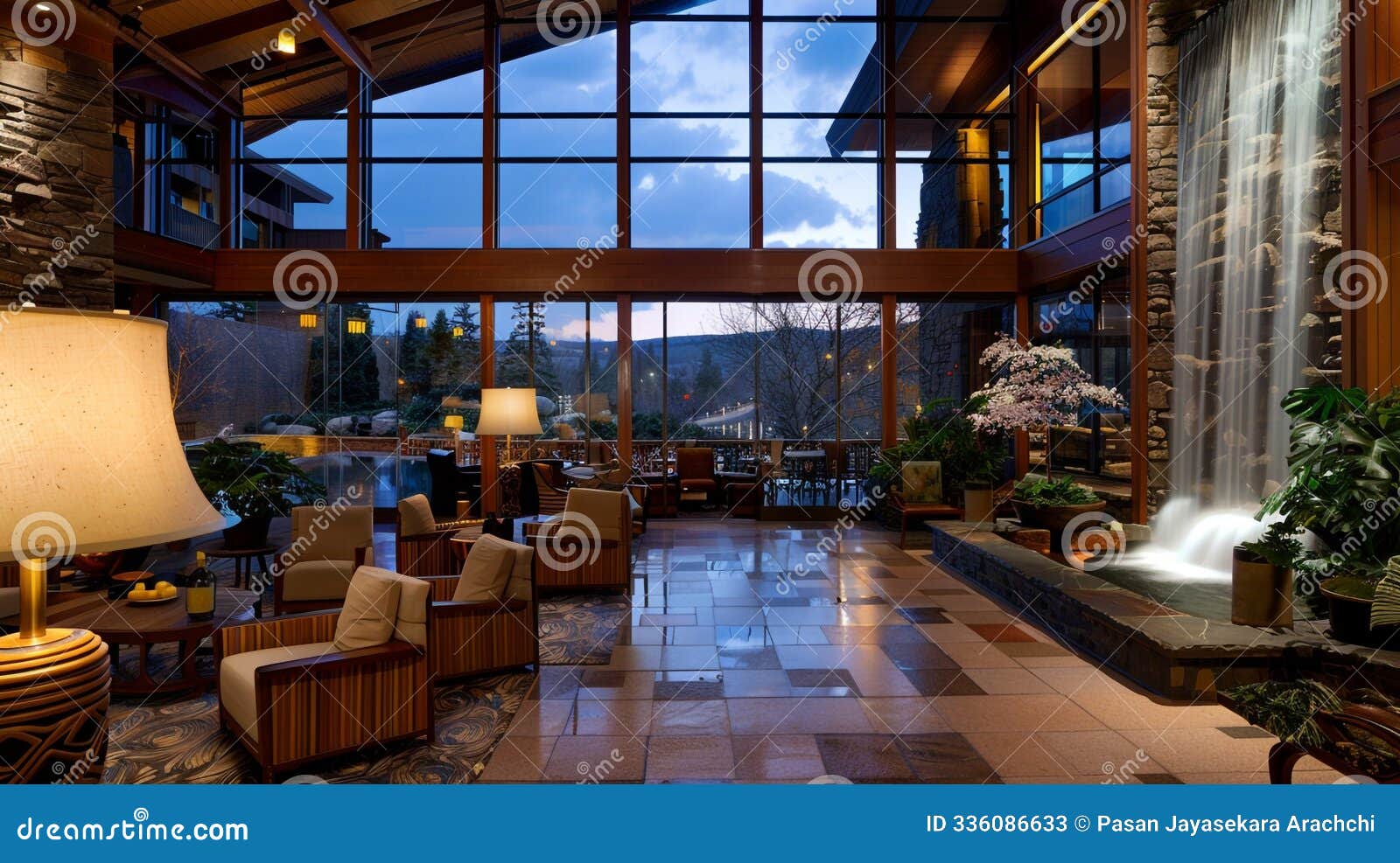 Hotel Lobby Featuring Panoramic Windows and Lounge Seating with a ...