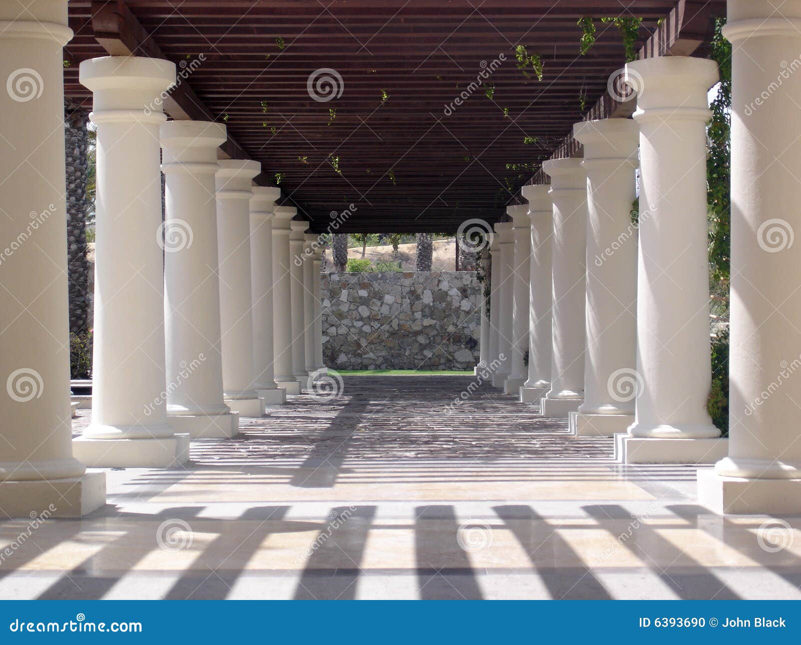 Hotel pillars and walkway stock photo. Image of breezeway - 6393690