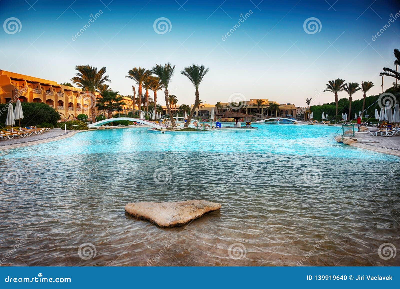 Hotel pool in Egypt stock photo. Image of luxury, tourist - 139919640