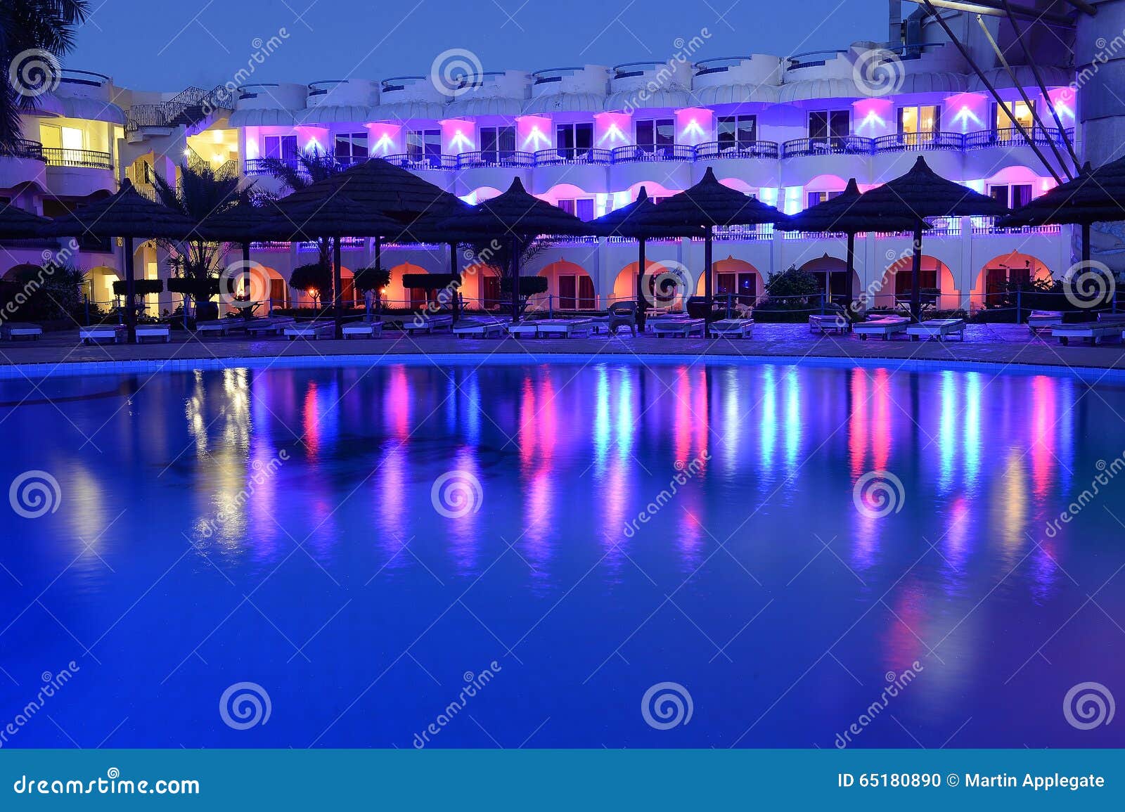 Hotel Pool Reflecting at Night Stock Photo - Image of light, exterior ...