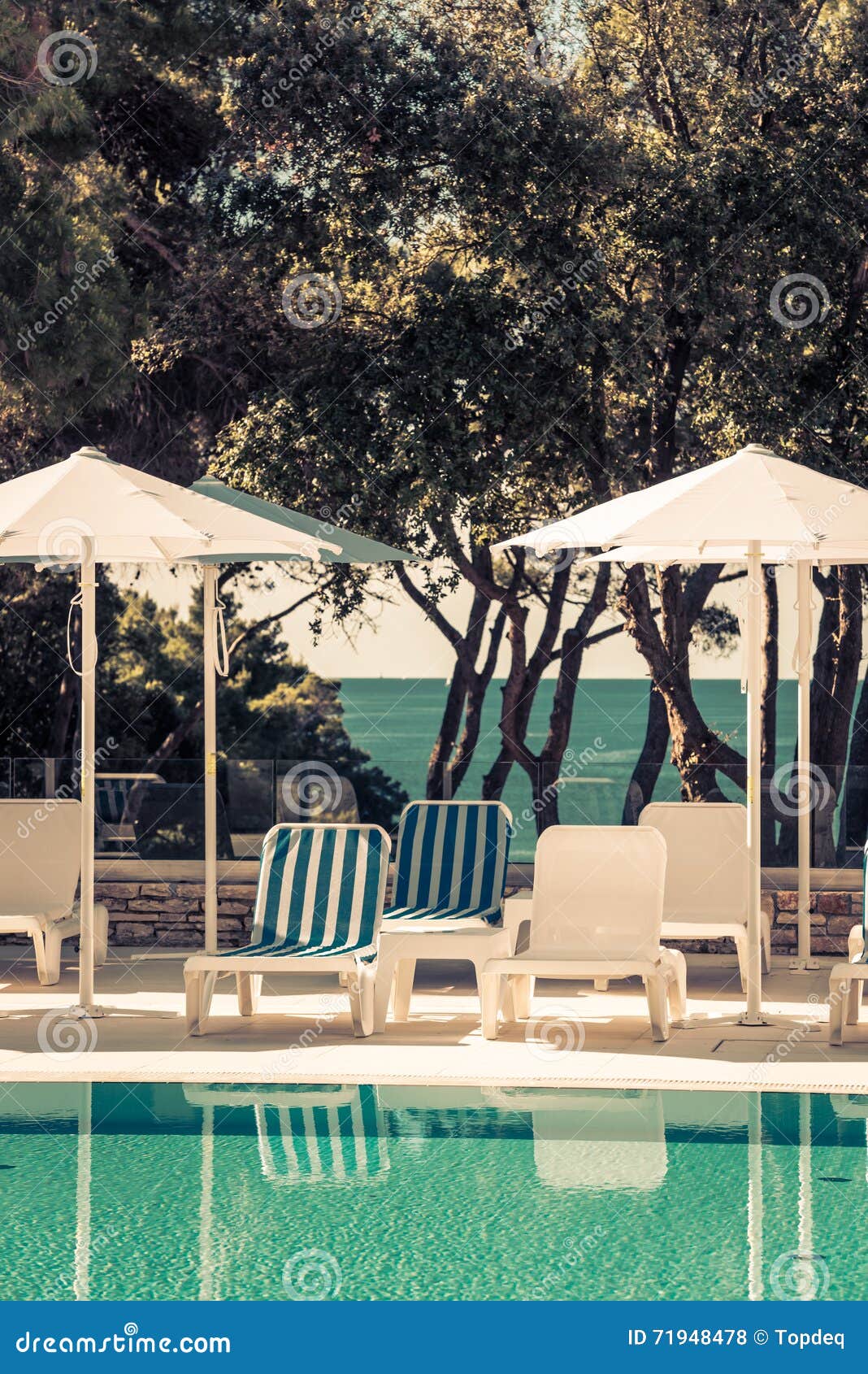 Hotel Poolside Chairs with Sea View Stock Photo - Image of hotel ...