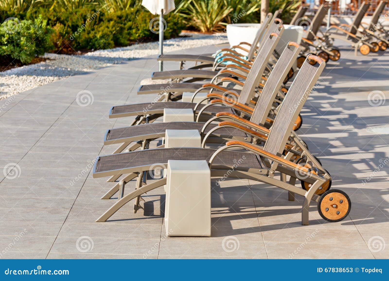 Hotel Poolside Chairs stock image. Image of tourism, horizontal - 67838653