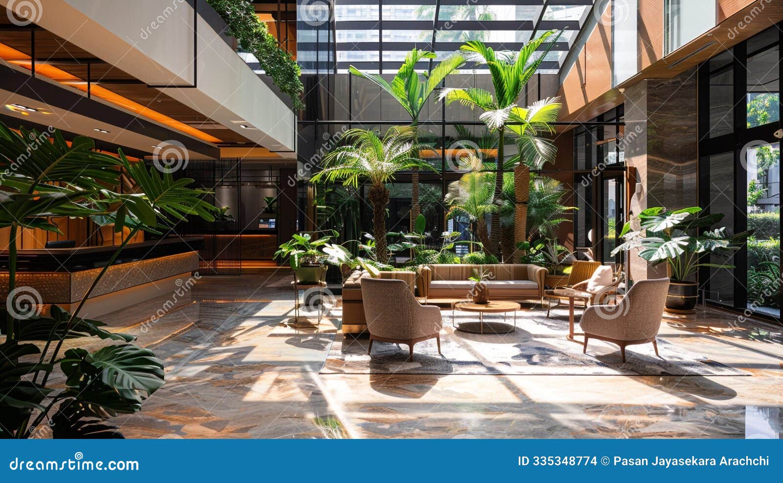 Hotel Reception Area Featuring Glass Atrium and Tropical Plants Stock ...