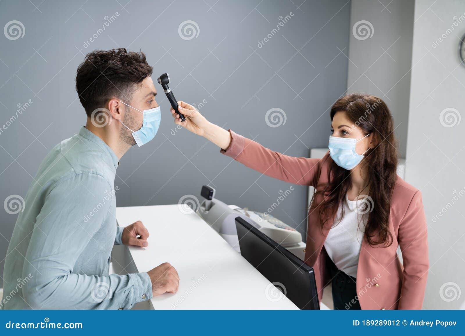 Hotel Reception Desk Temperature Check Stock Photo - Image of fever ...
