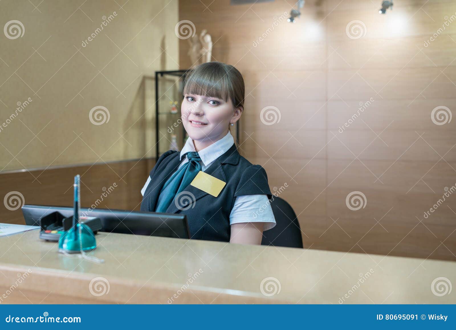 Hotel Reception. Pretty Hostess Smiling at Camera Stock Image - Image ...