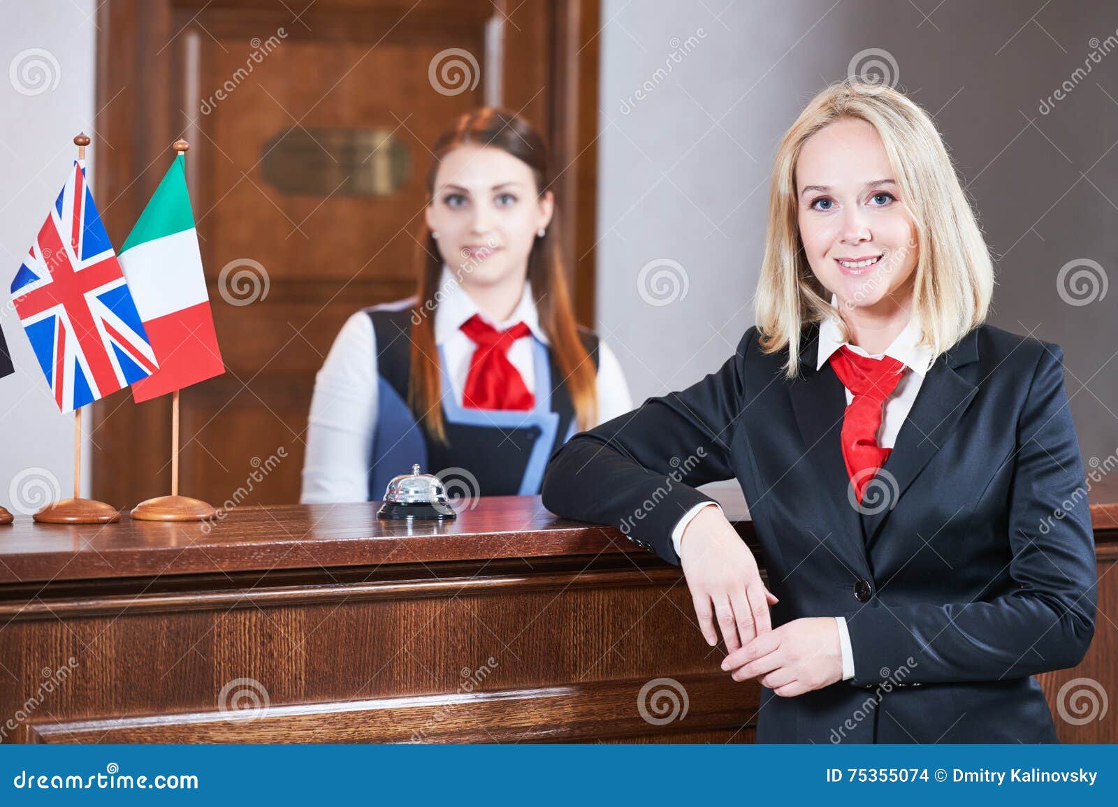 Hotel reception worker stock photo. Image of counter - 75355074