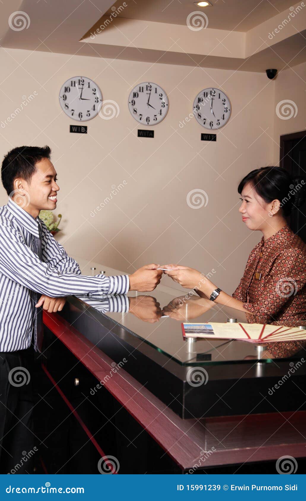 Hotel receptionist stock image. Image of receptionist - 15991239