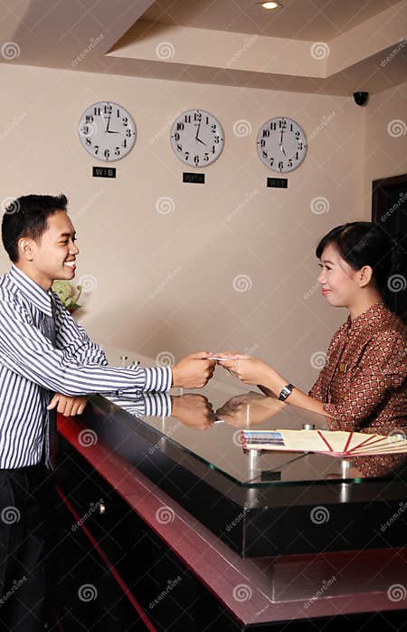 Hotel receptionist stock image. Image of receptionist - 15991239